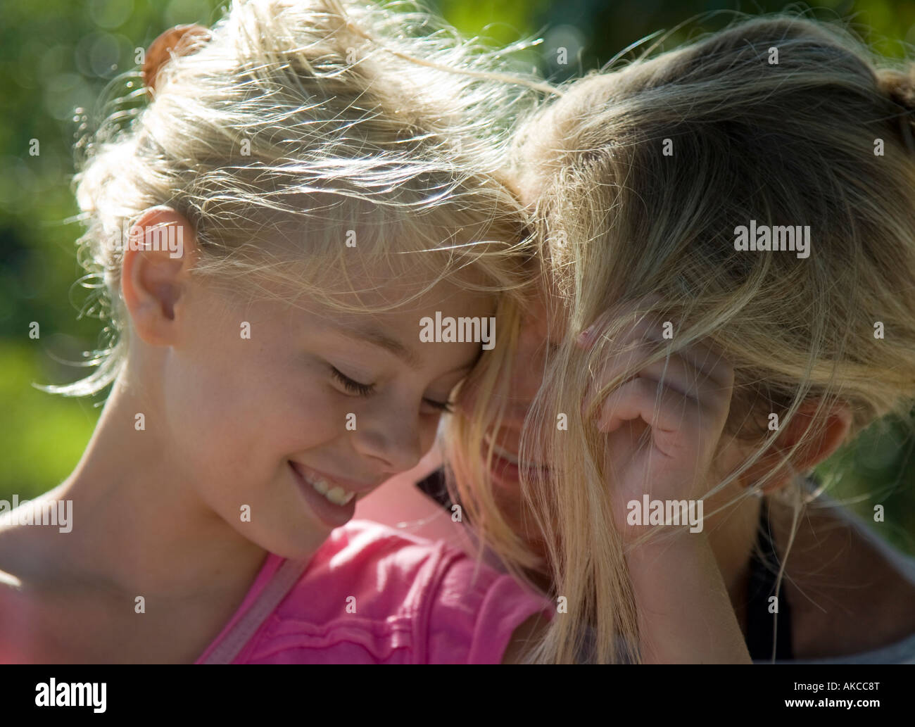 Mother and daughter face to face Stock Photo - Alamy