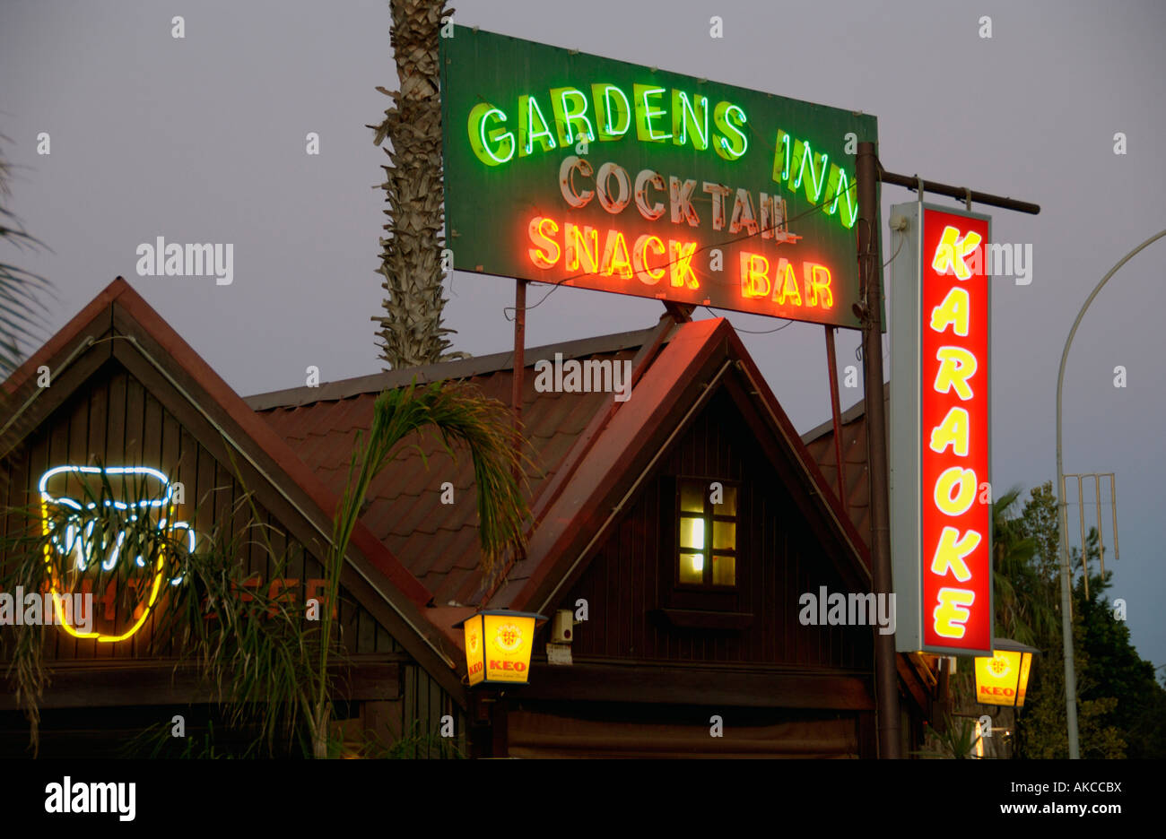 Illuminated neon sign at Gardens Inn bar in Ayia Napa on the ...