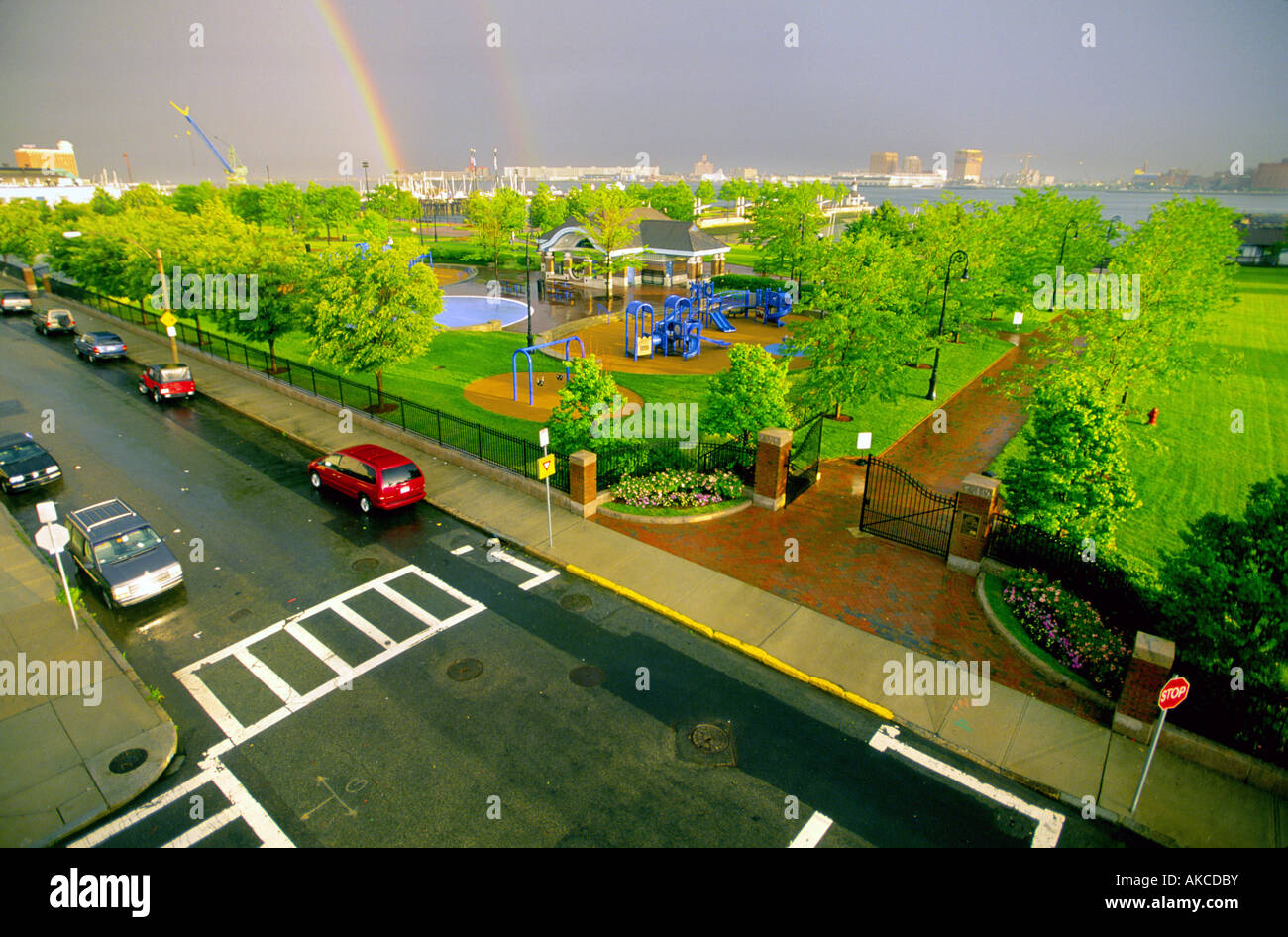 A rainbow forms over Piers Park waterfront East Boston Stock Photo - Alamy