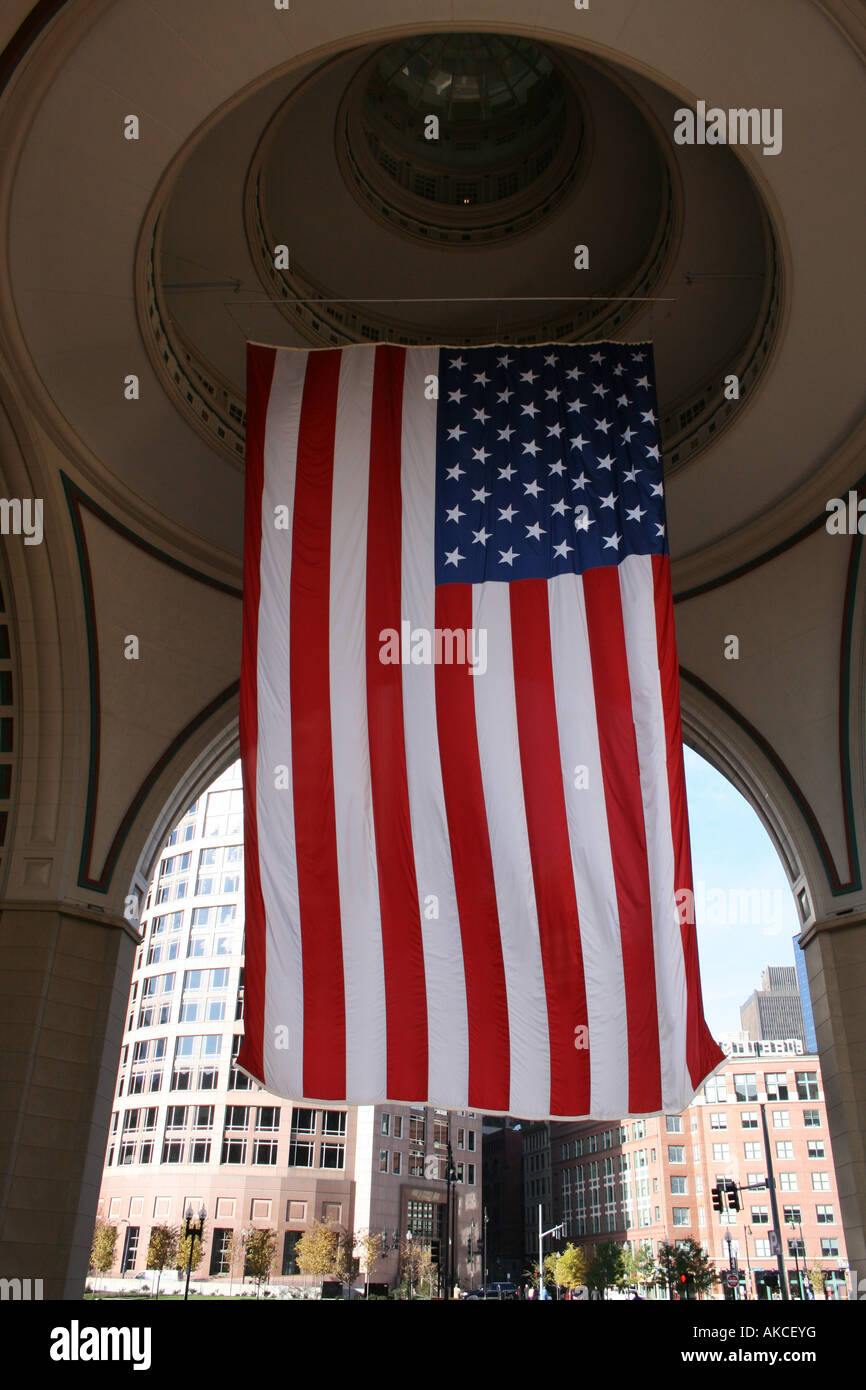 United States of America flag hanging from a rotunda and waving in the ...