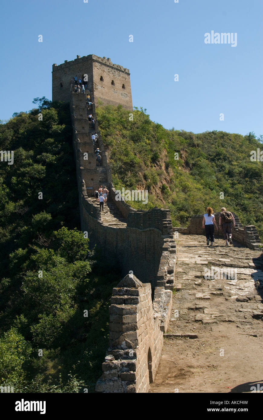 Walkers confront an extremely steep staircase on the Great Wall of ...