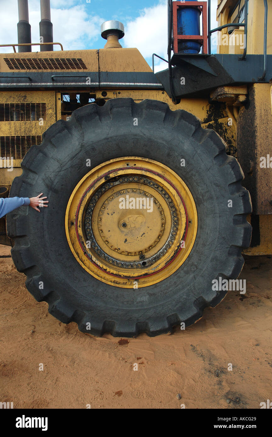 Human hand provides scale for massive earthmover tire coal mine central ...