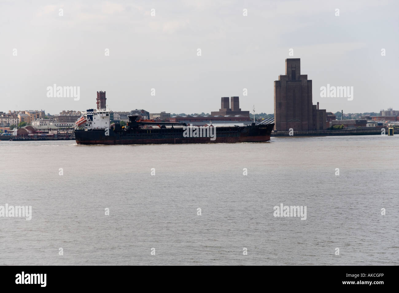 Ship passing Birkenhead from the Albert Dock,Liverpool,heading down the ...