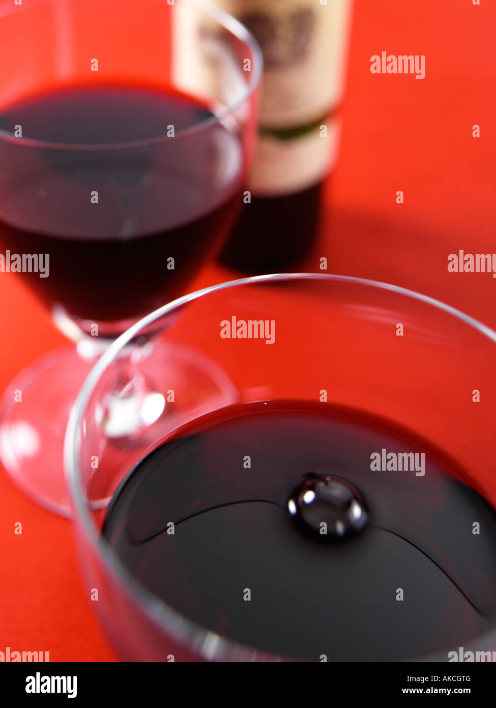 A bottle and two glasses of Bordeaux French red wine Stock Photo - Alamy
