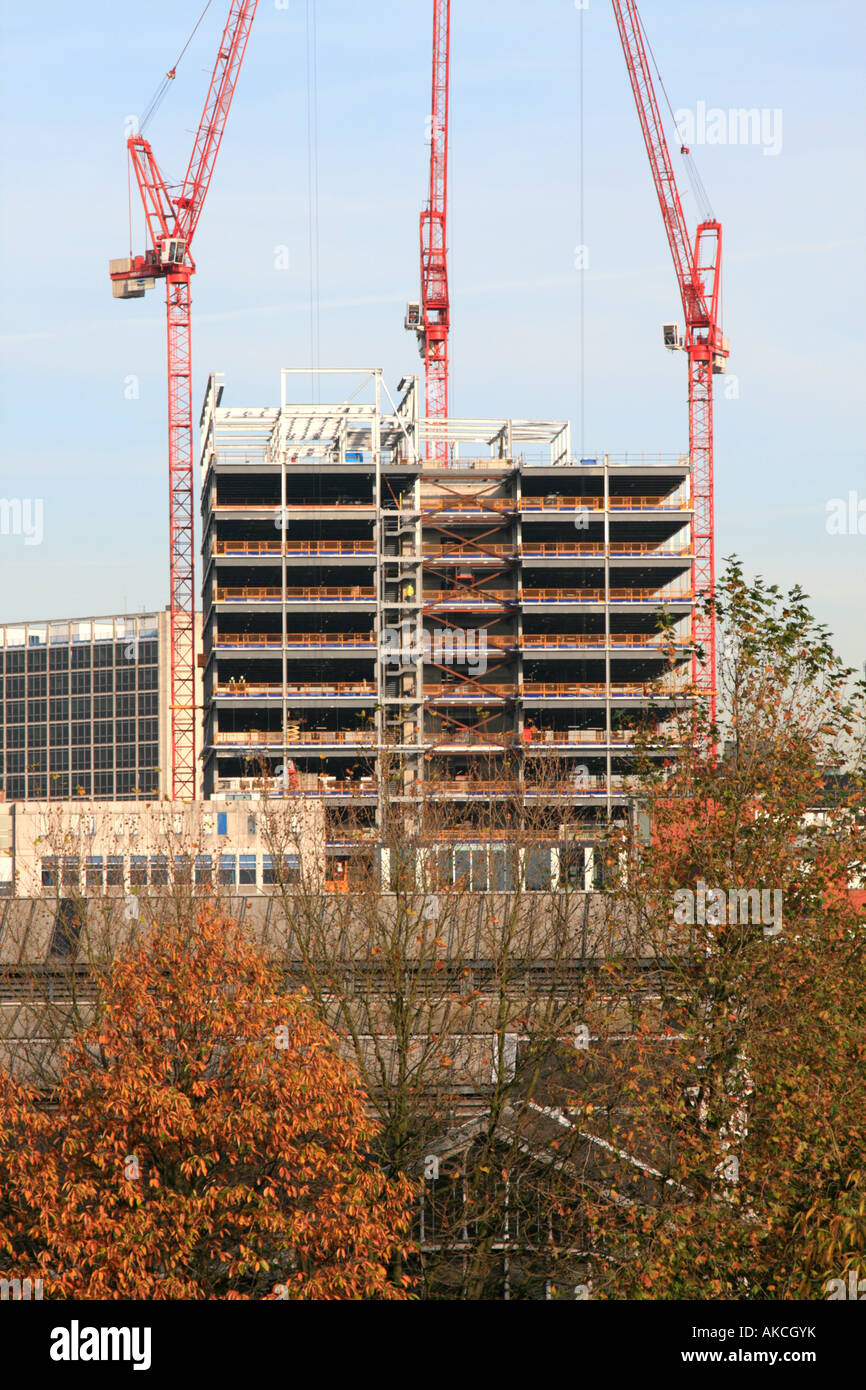 new building tower cranes construction manchester city centre england ...