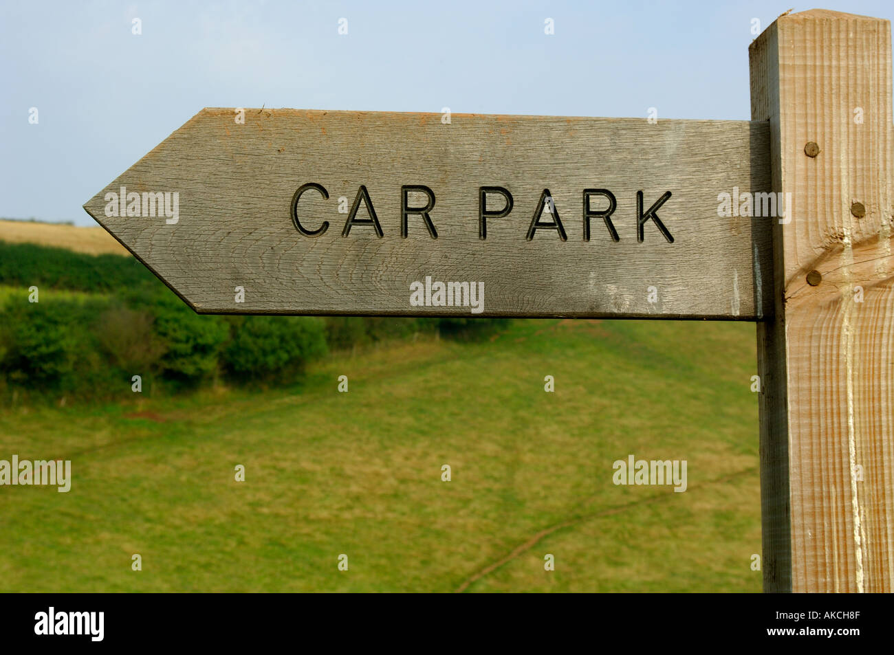 Wooden car park sign in British countryside Stock Photo - Alamy