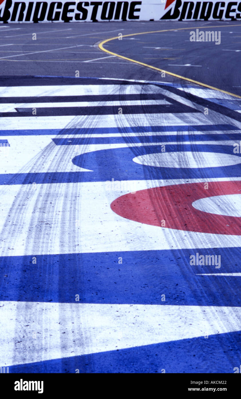 Tyre marks across painted advertising Mobil Oil on the Formula One ...