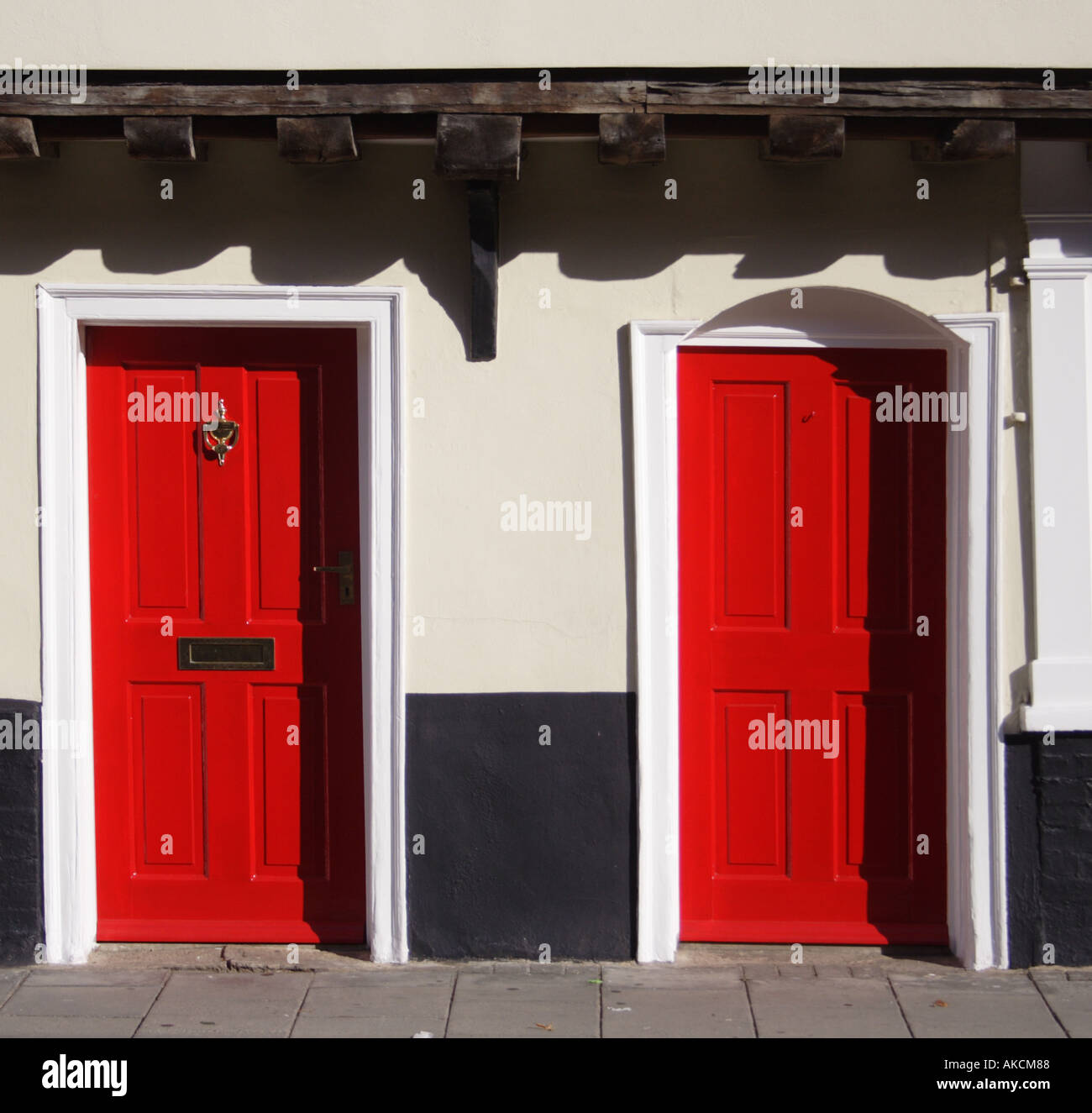 Picturesque red panelled doors to a timber framed house in Bury St ...