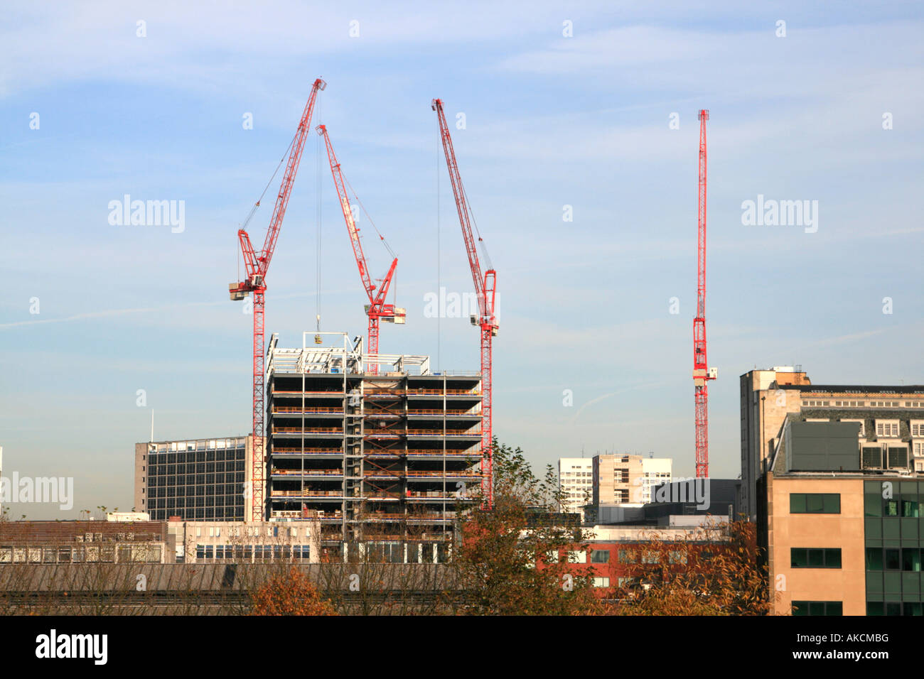 new building tower cranes construction manchester city centre england ...