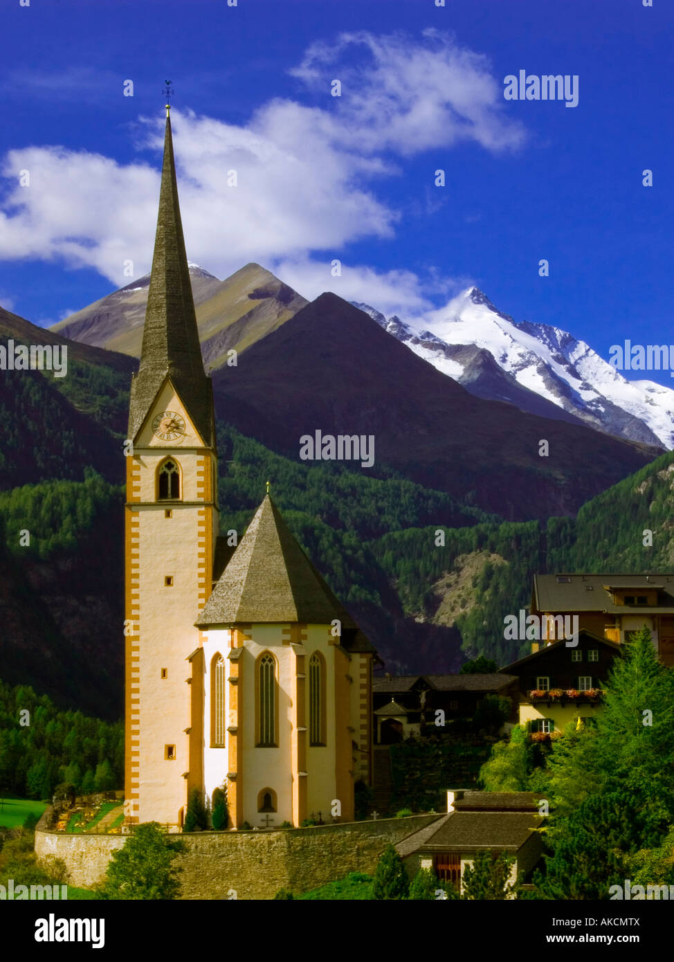 Church nestled in the Alps under the Mighty Grossglockner,(Austrias ...