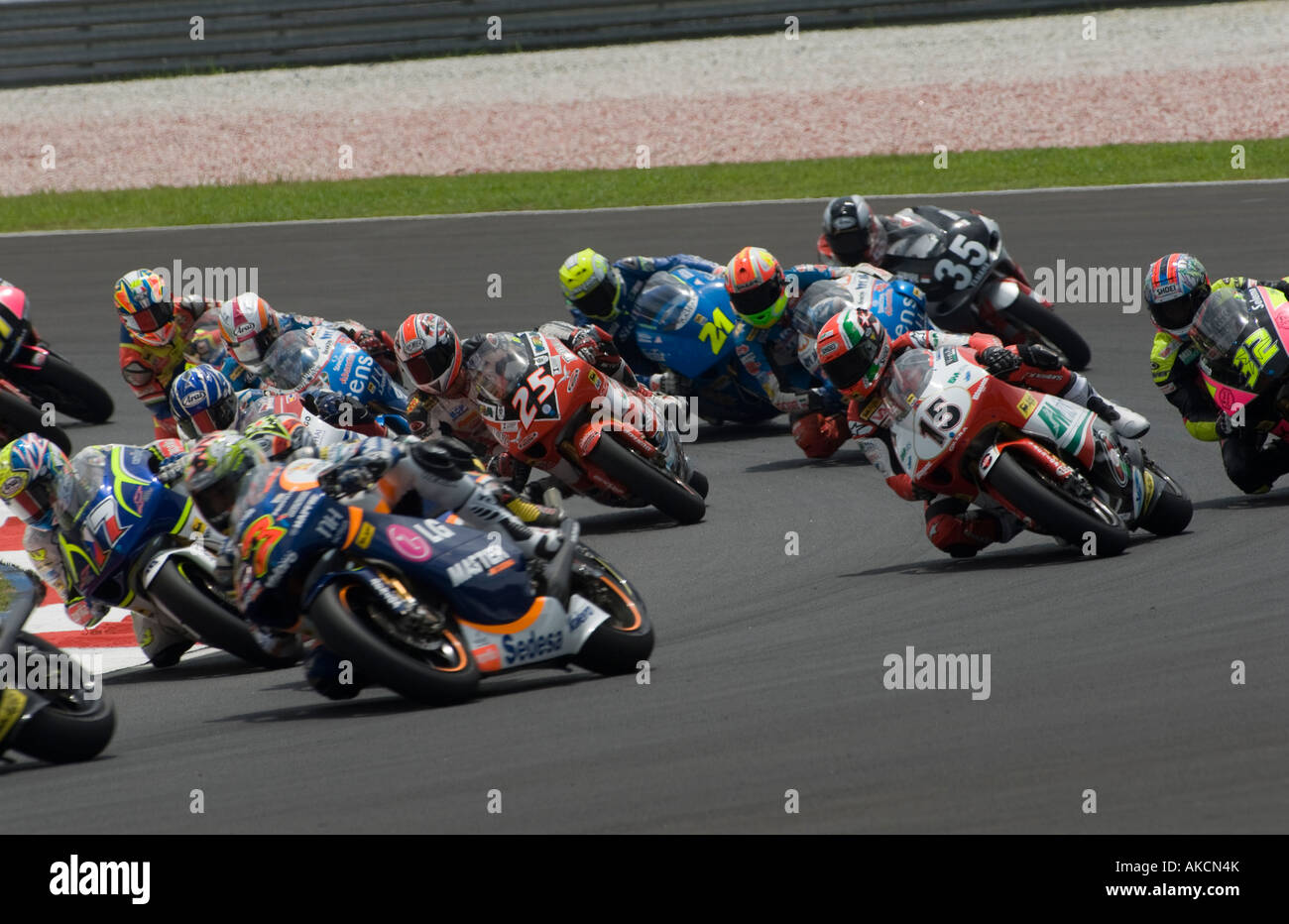 125cc riders at turn 2 during race day Stock Photo - Alamy