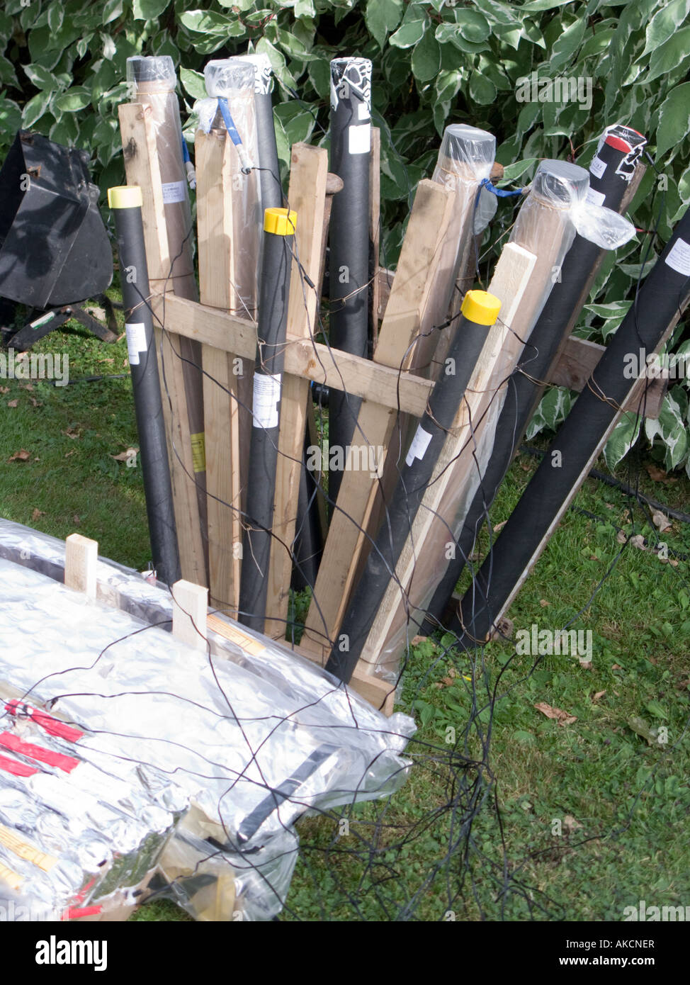 fire works in the day time setting up ready to fire Stock Photo - Alamy