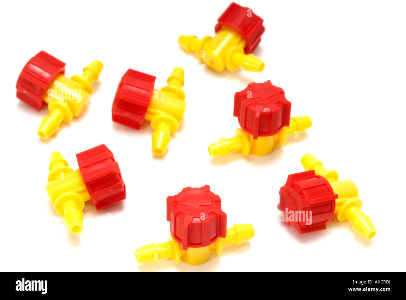 Red and yellow plastic "stop taps" for diy "self watering" system for ...