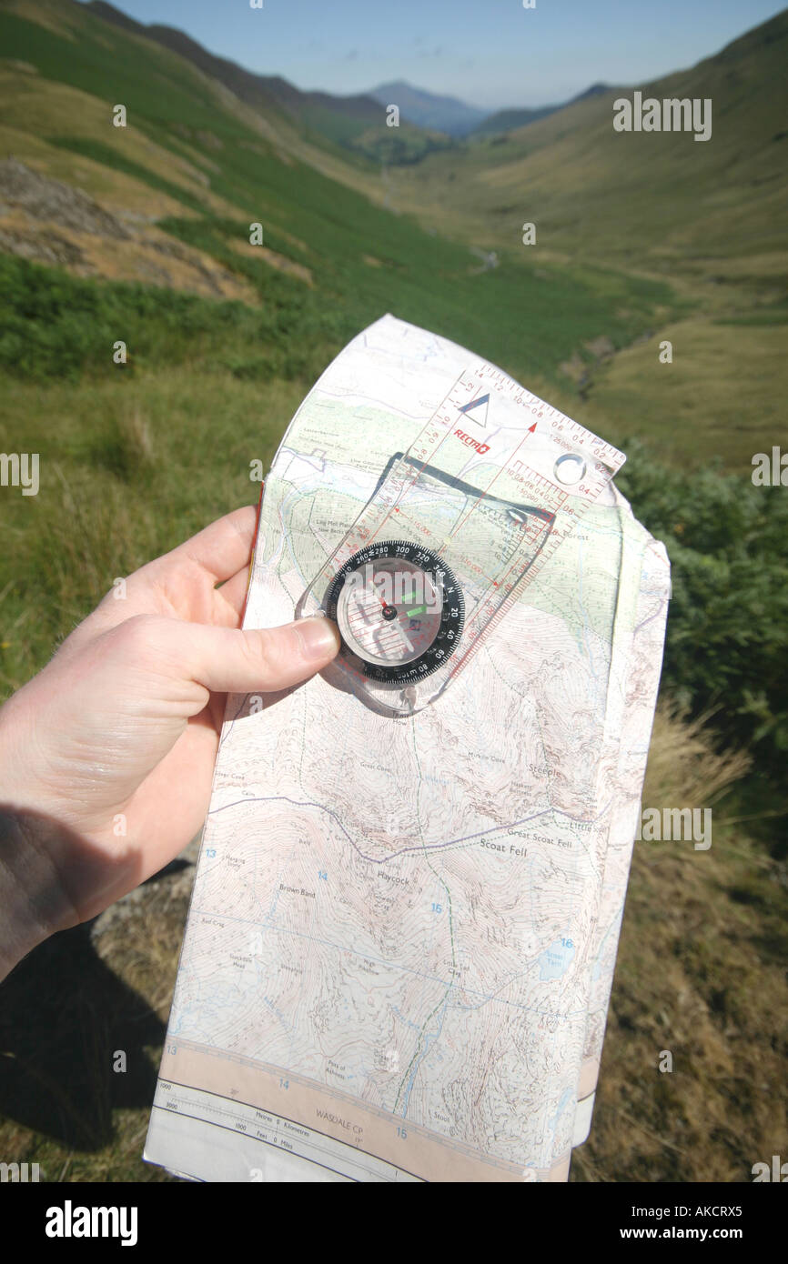 A stock photograph of a Compass and Map with Newlands Valley in Lake ...