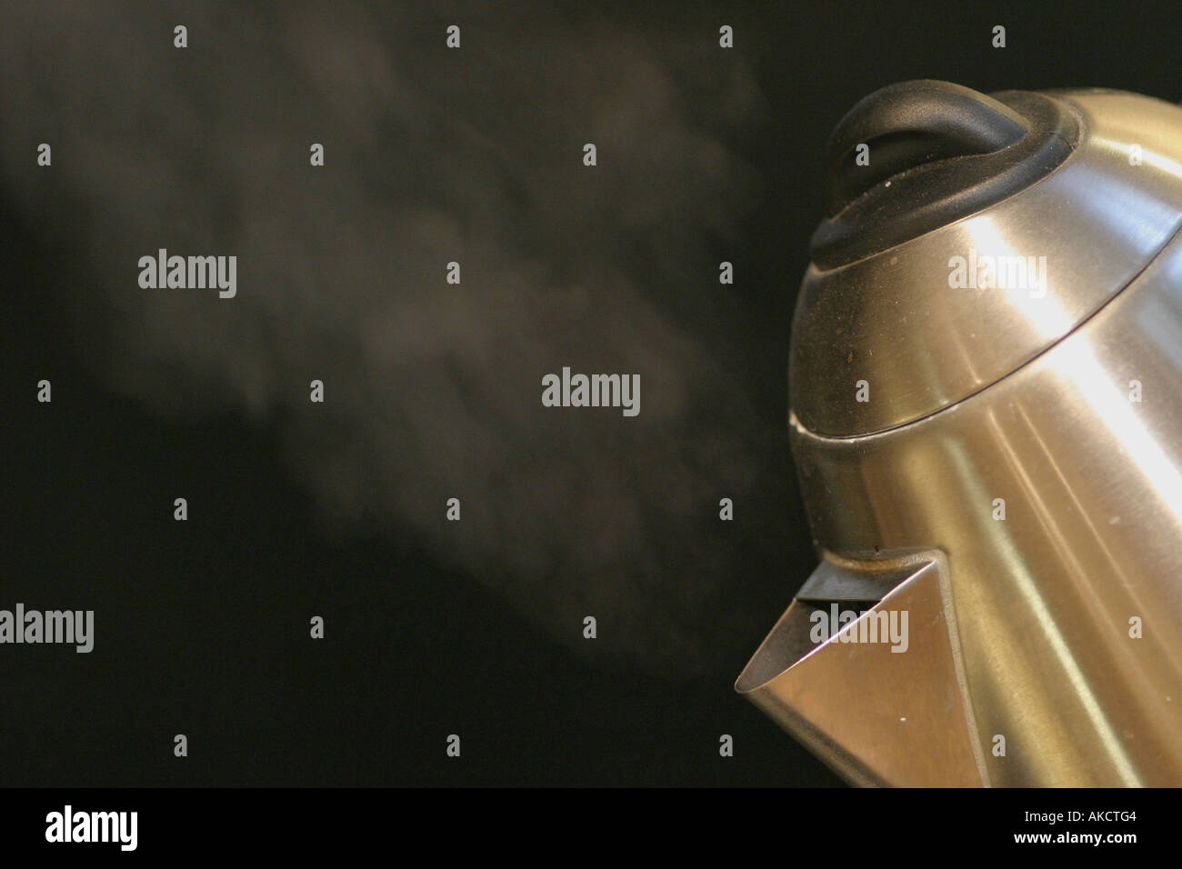 A Stock Photograph of a Kettle Boiling With Steam Out of It Stock Photo ...