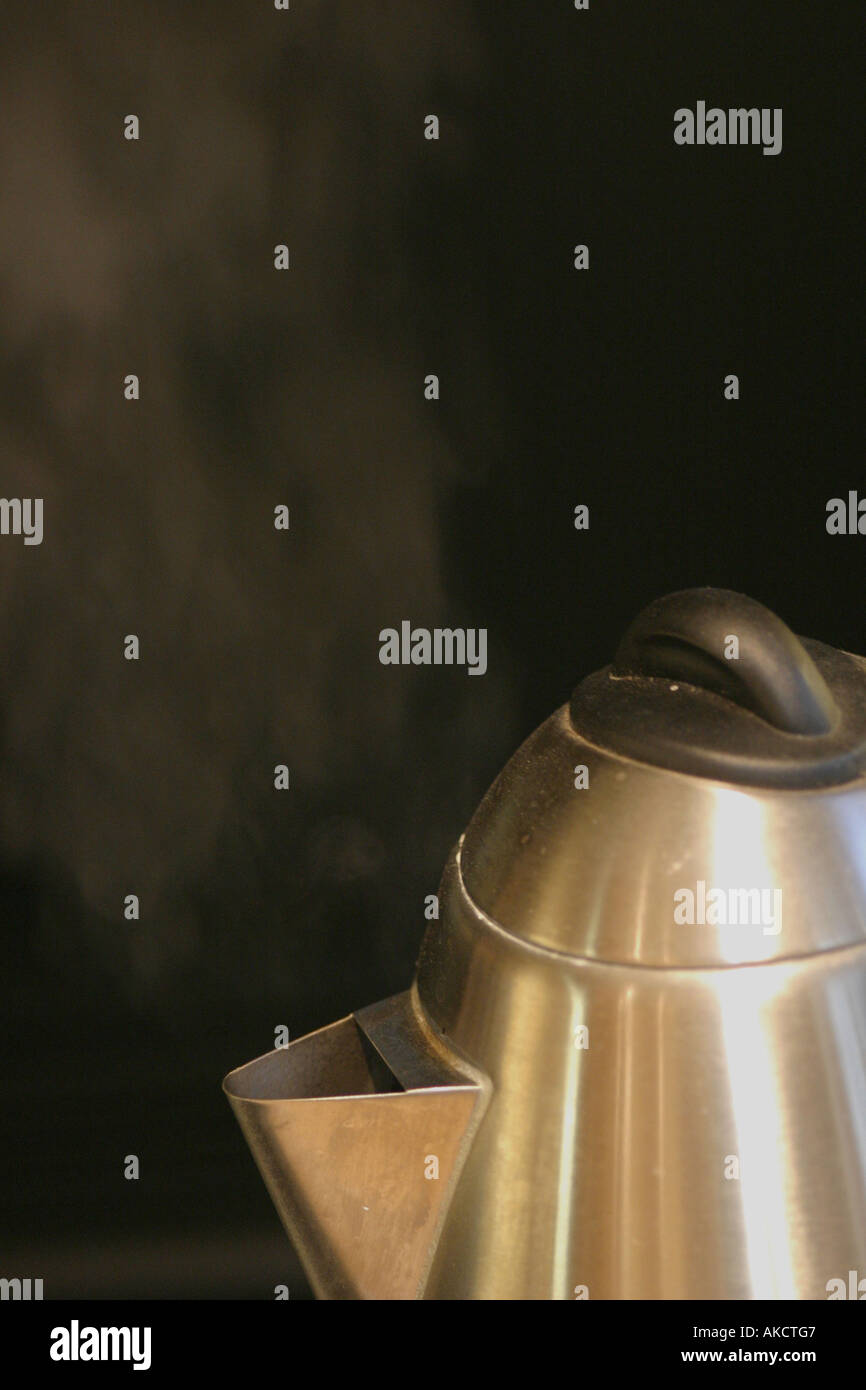 A Stock Photograph of a Kettle Boiling With Steam Out of It Stock Photo ...