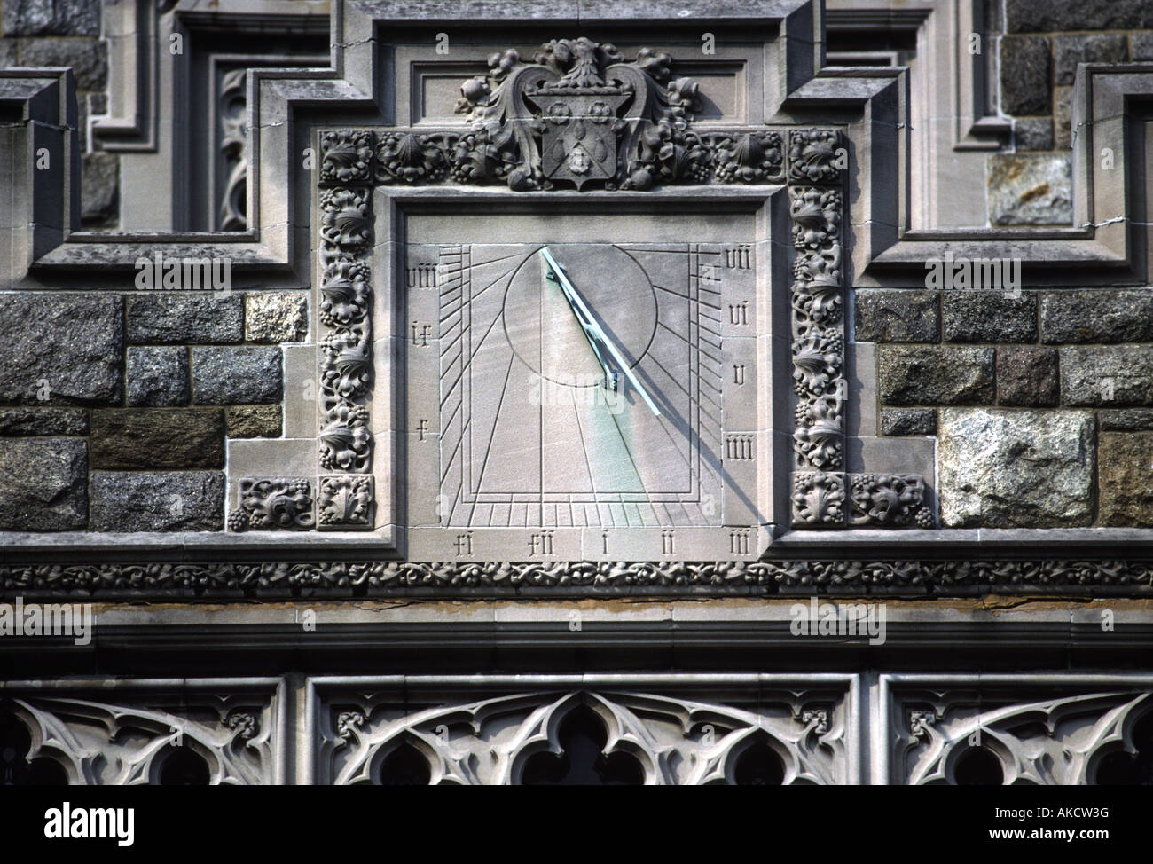 Gothic architecture facade sundial Stock Photo - Alamy