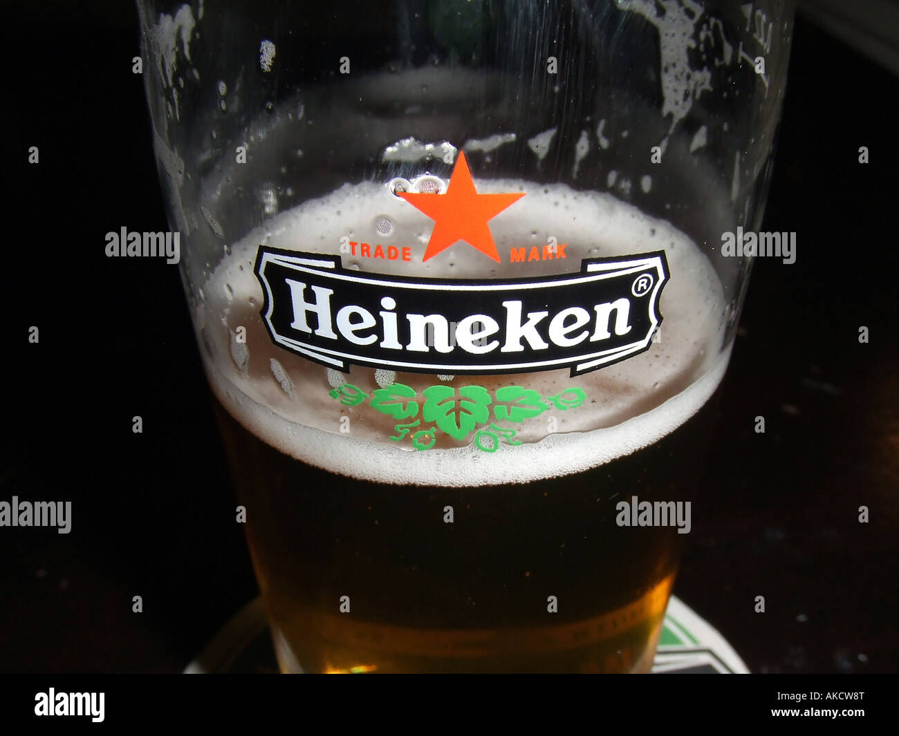Glass of Heineken lager Stock Photo - Alamy