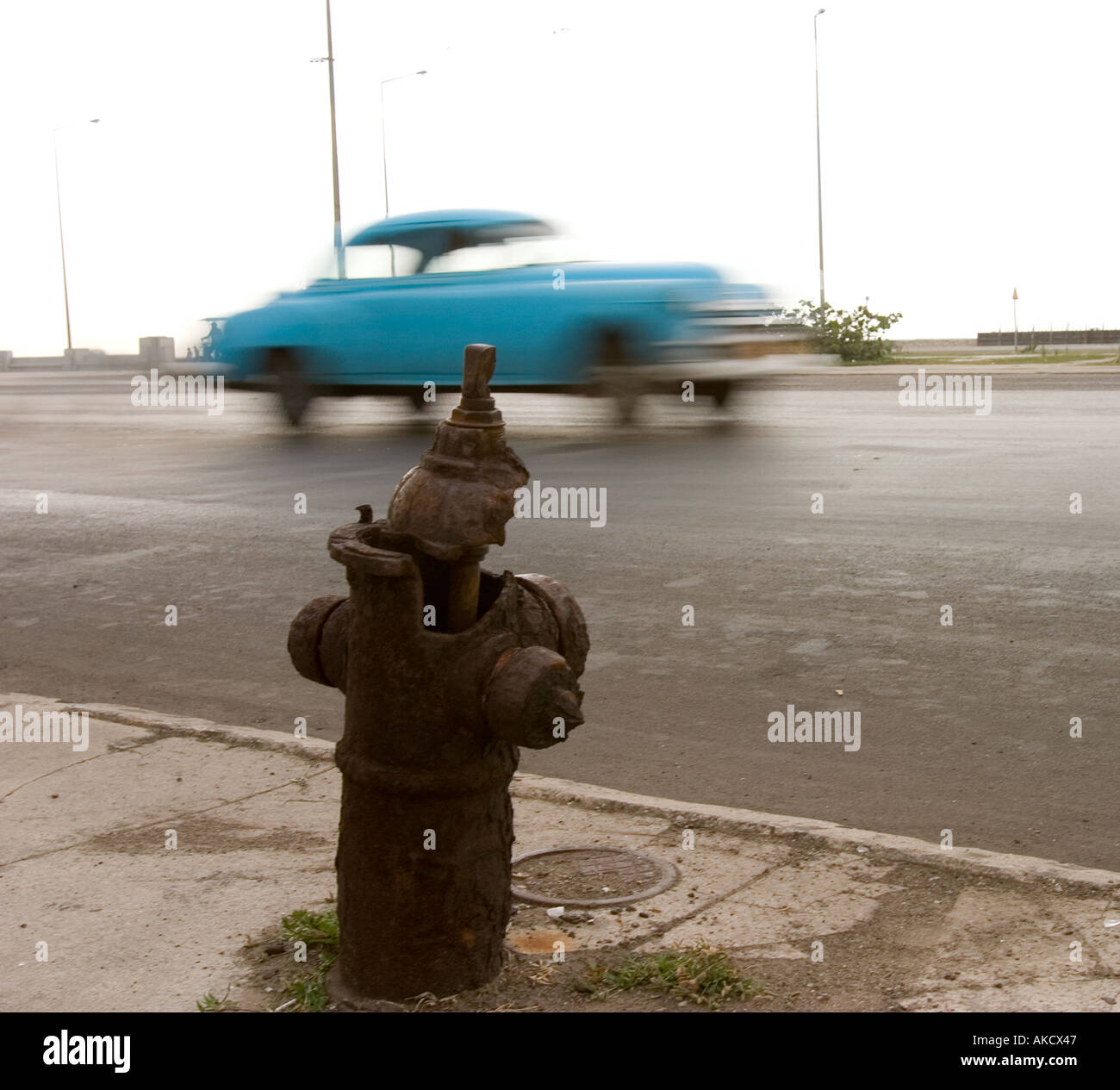 Rusted Fire Hydrant and Classic Car in Havana Cuba Stock Photo - Alamy