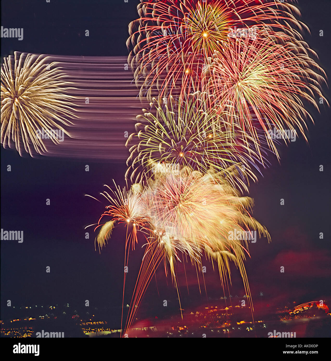 launching fireworks in different colours on black night sky Stock Photo ...