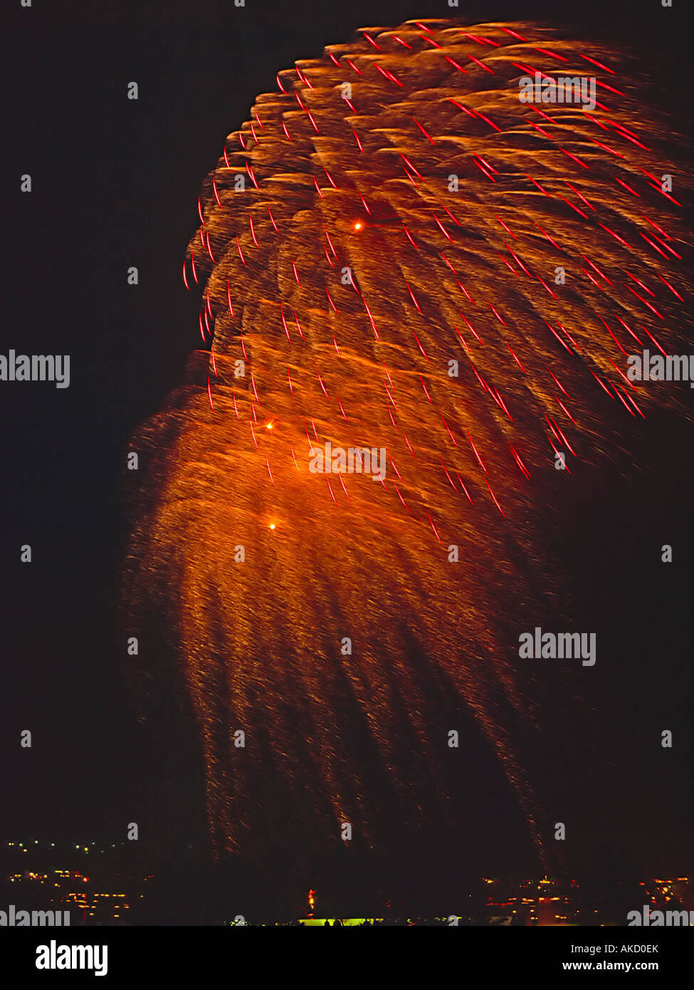 launching fireworks in different colours on black night sky Stock Photo ...