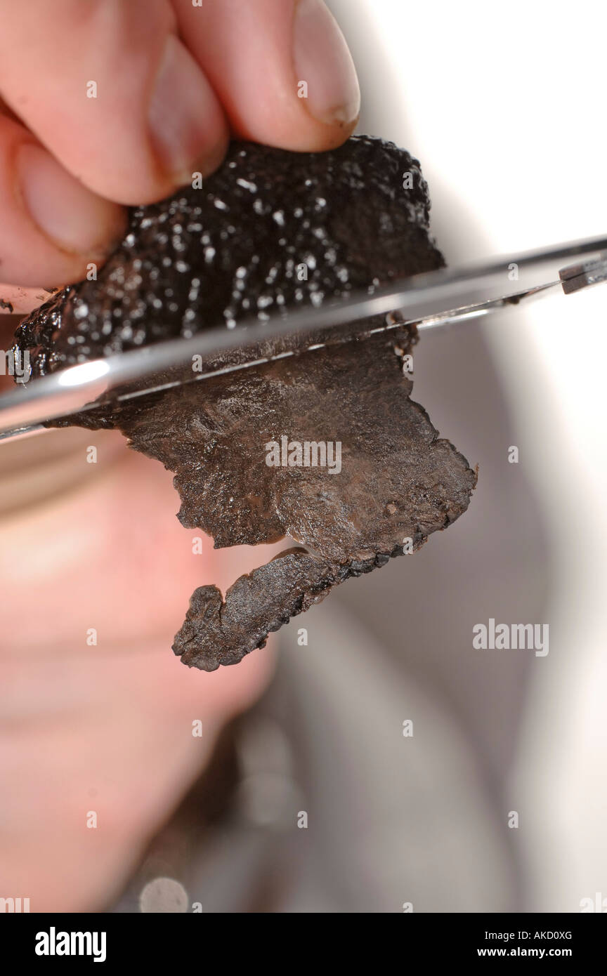 Shaving a truffle Stock Photo - Alamy