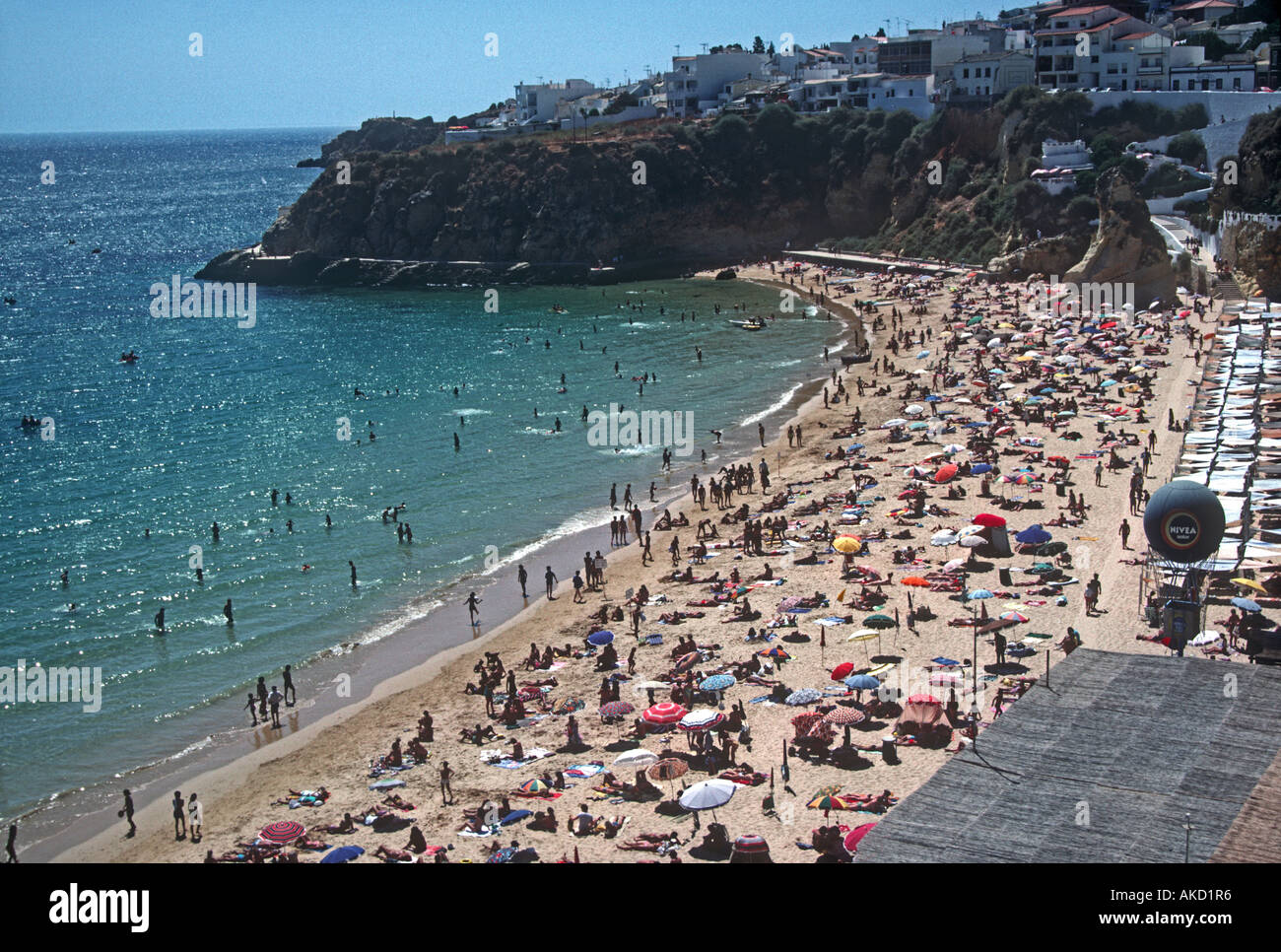 Beach scene with sunbathers, Albufeira, Algarve, Portugal Stock Photo ...