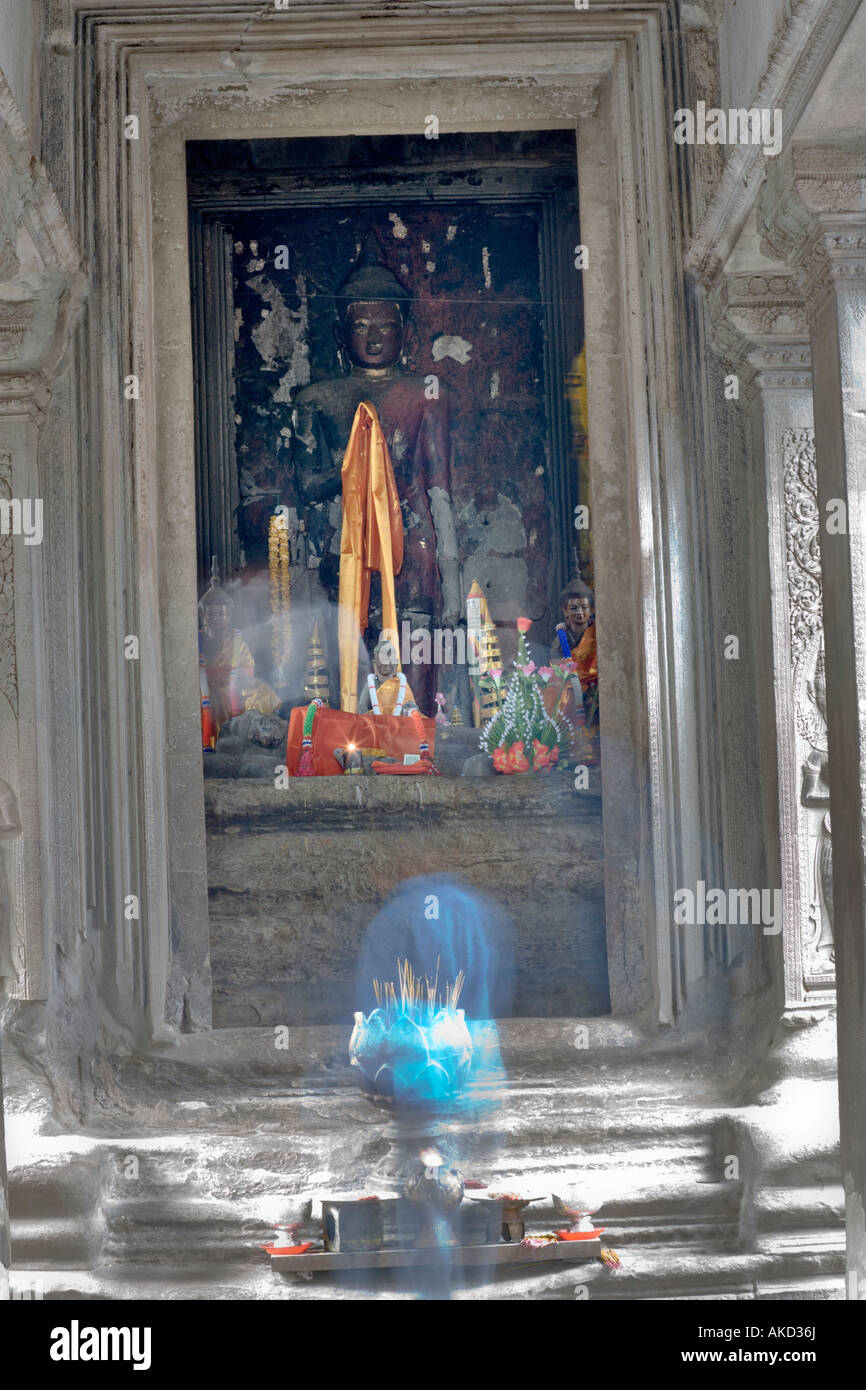 Ghost figures in front of Buddha Angkor Cambodia Stock Photo - Alamy