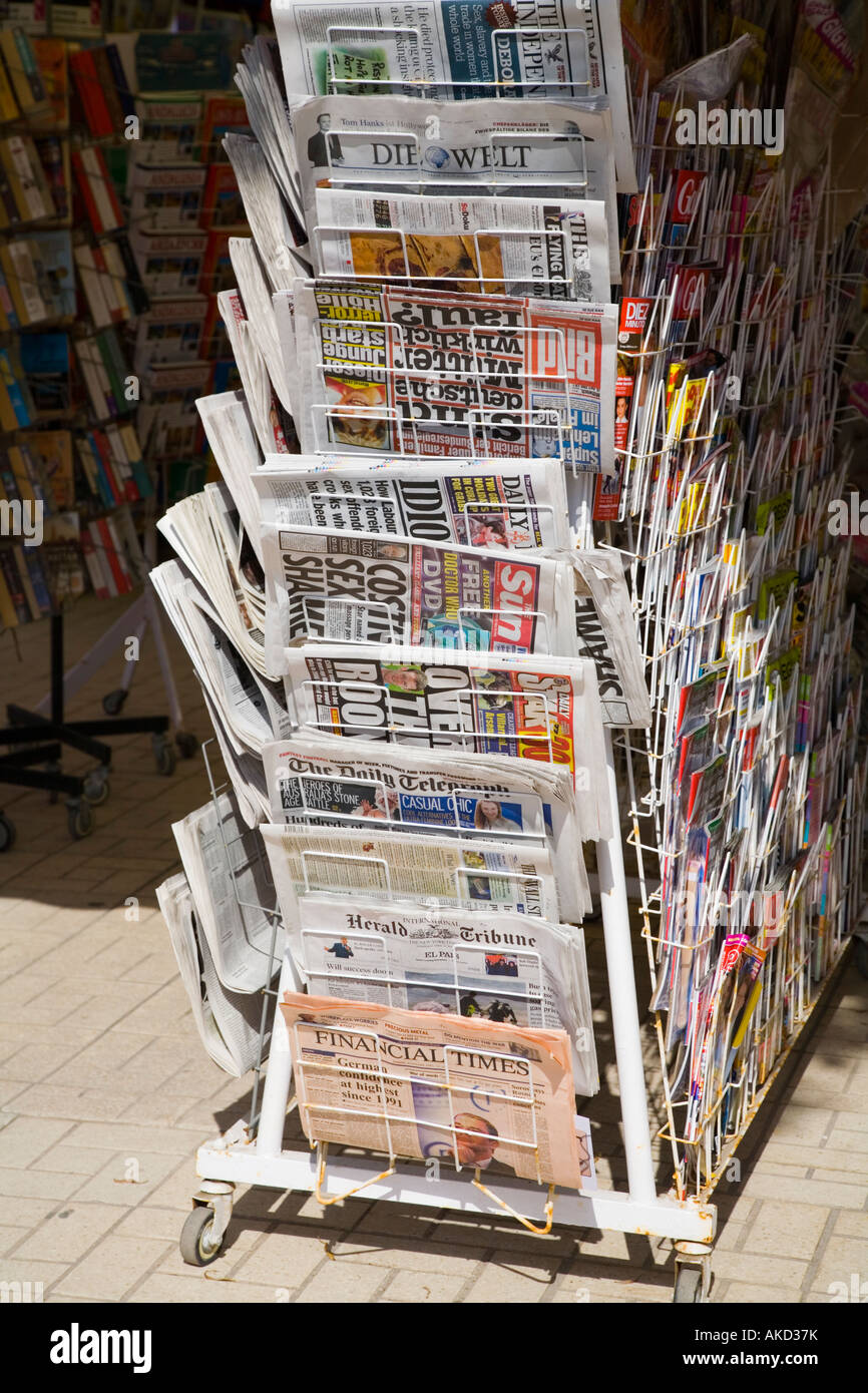 International newspapers and magazines on news stand Stock Photo - Alamy