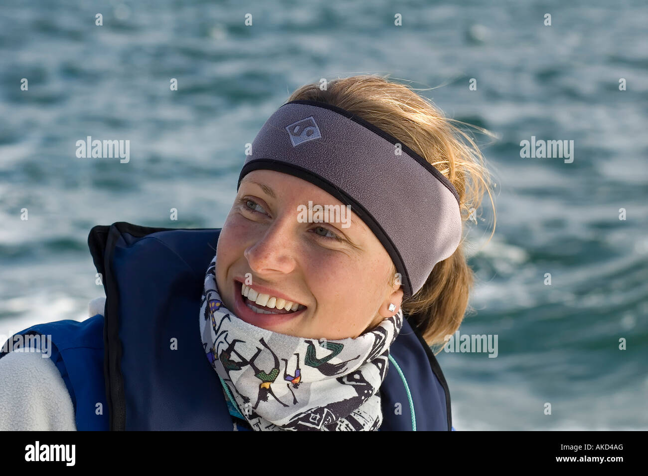 Young woman sailing, inflatable, life jacket Stock Photo - Alamy