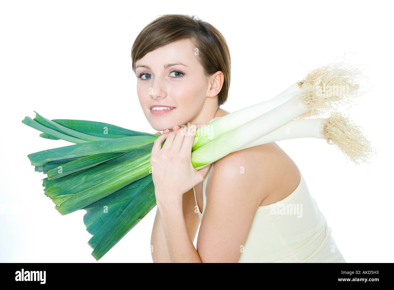 young woman carrying leeks Stock Photo - Alamy