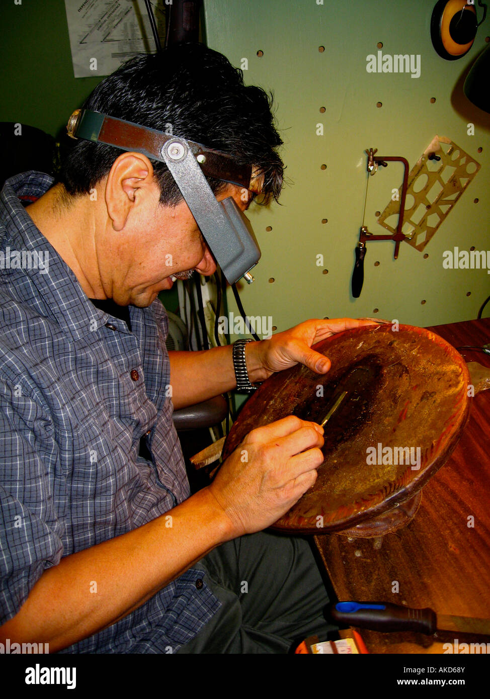 Vancouver Eastside Culture Crawl native silversmith at work Stock Photo ...