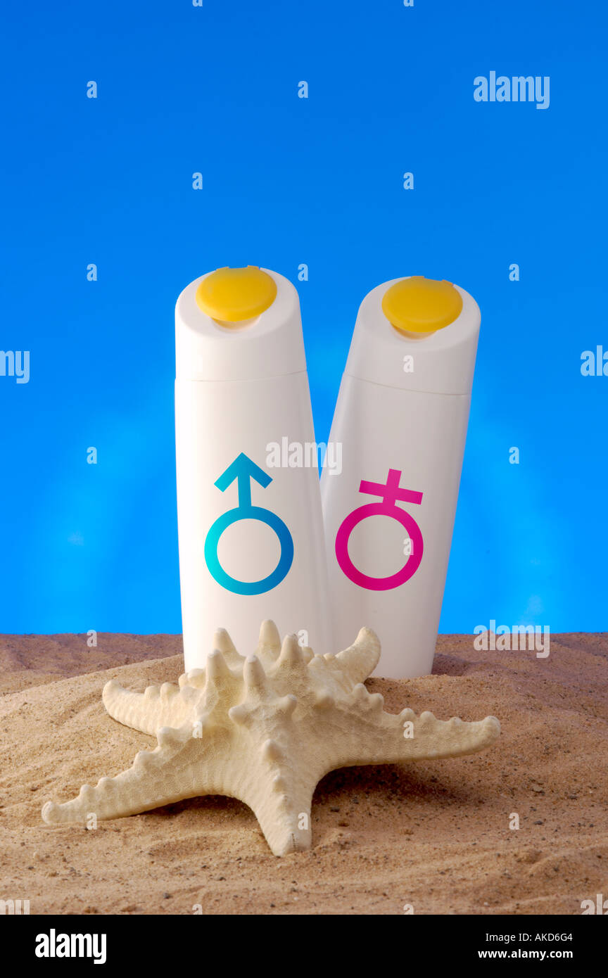 Studio shot of white unbranded sunscreen bottles with male gender ...