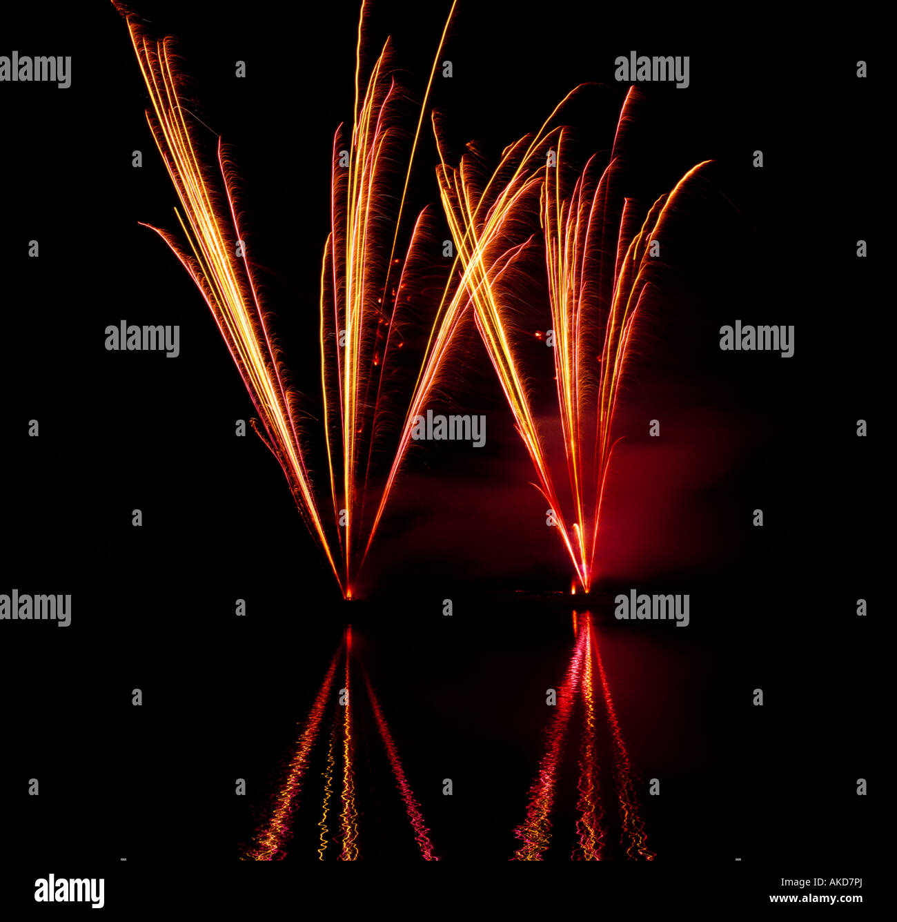 Fireworks reflected in water Stock Photo - Alamy