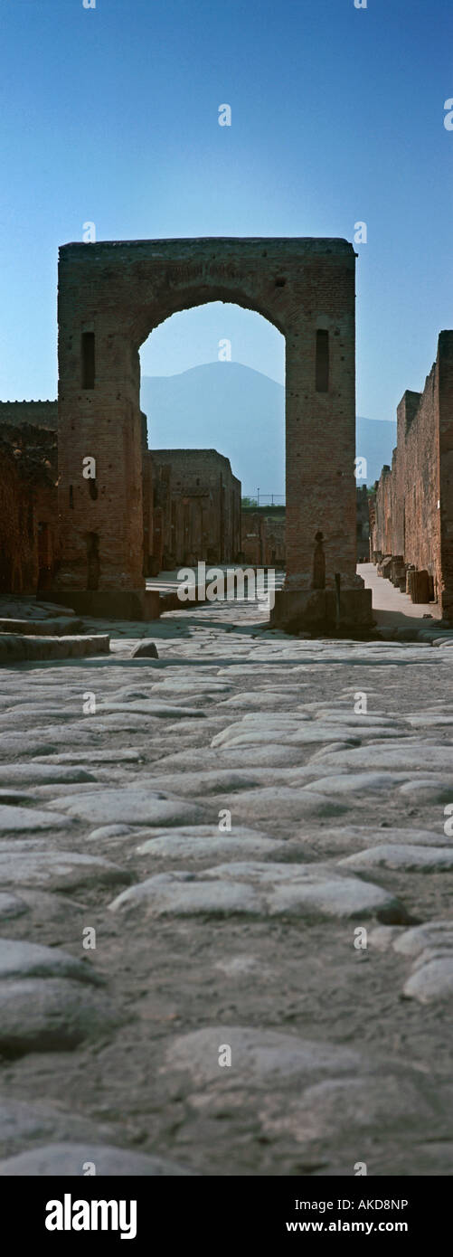 Road, archway and Vesuvius on via del Foro, Pompei Stock Photo - Alamy