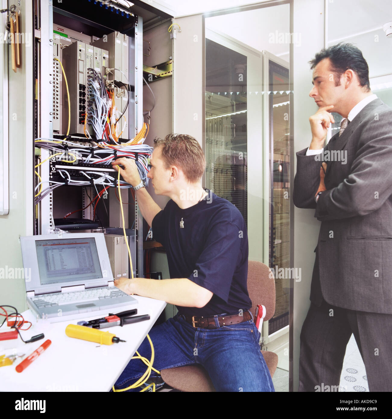 Man doing his highly specialized work in a computer communication ...
