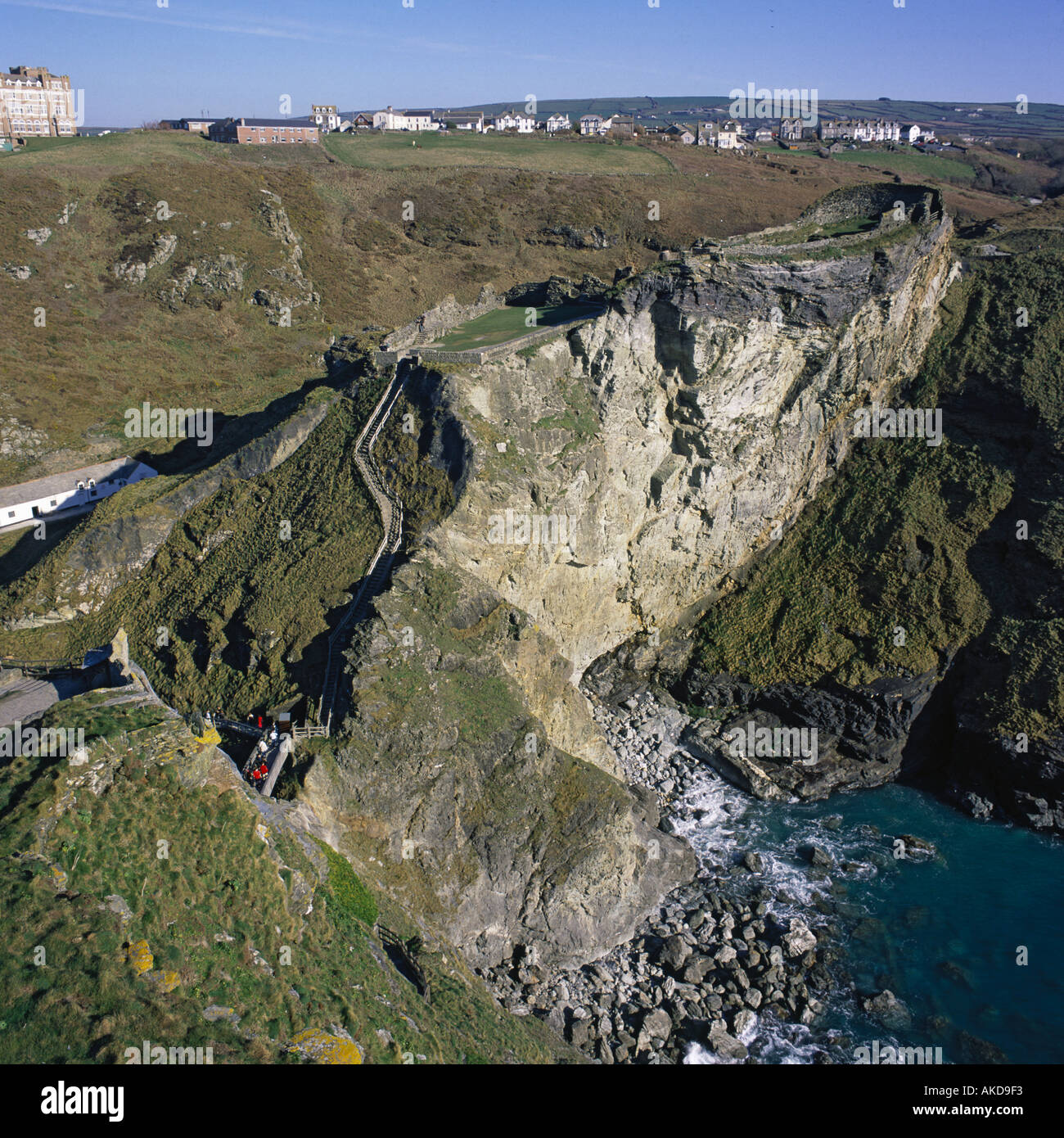 View looking back to mainland with village houses over path along ...