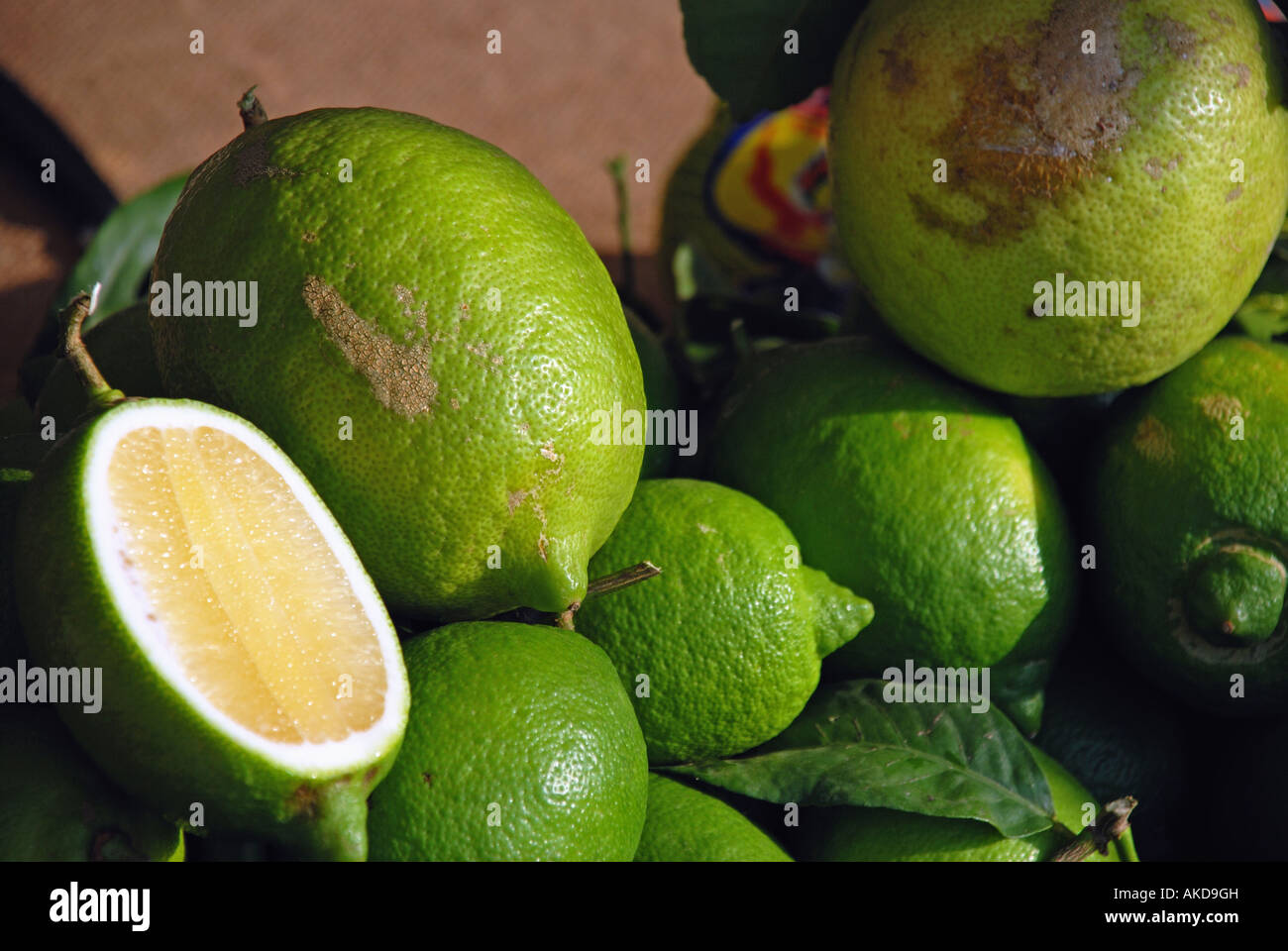 A display of organic limes in Italy Stock Photo - Alamy