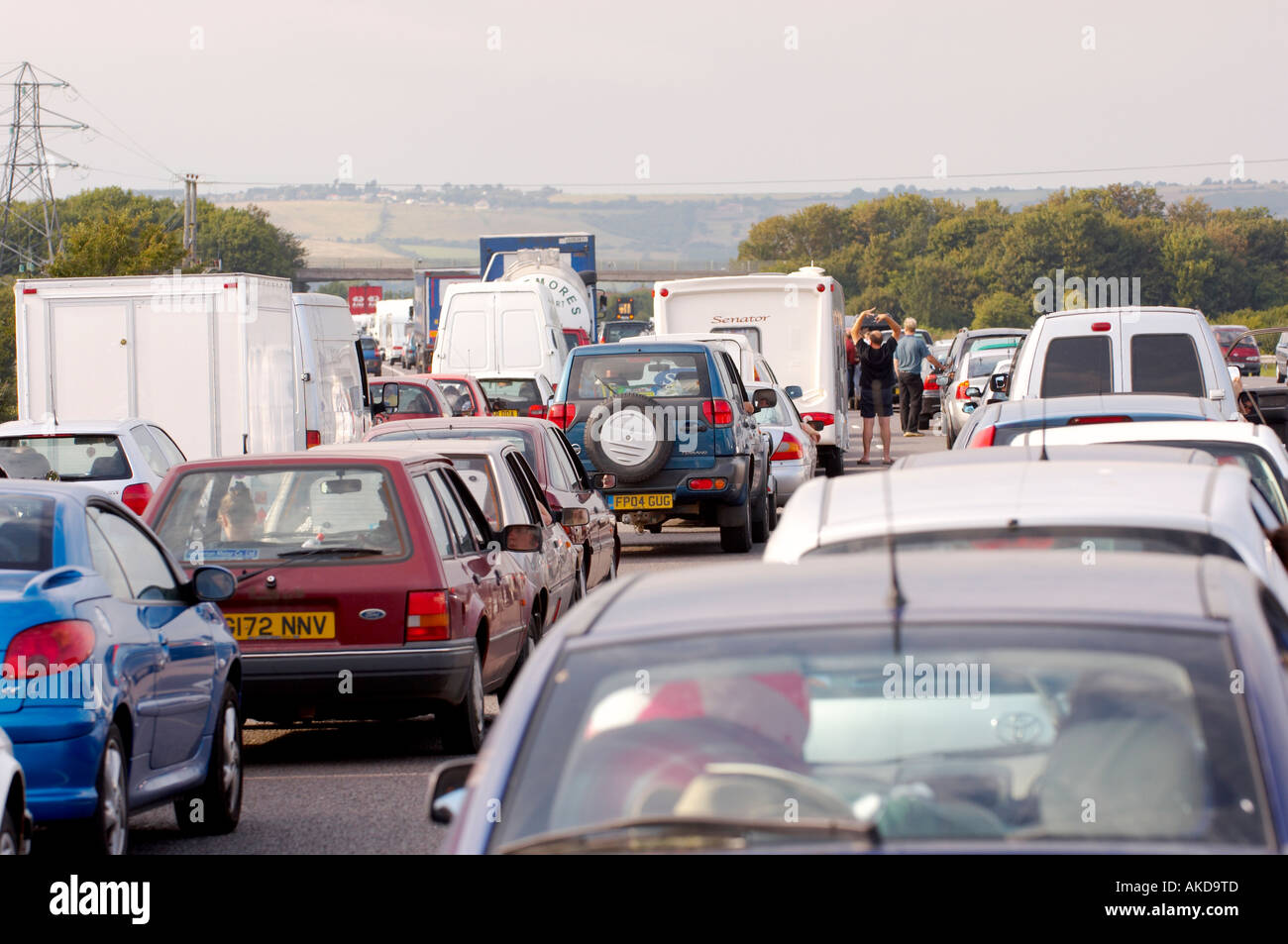Major traffic jam on M5 motorway with drivers getting out of their cars ...