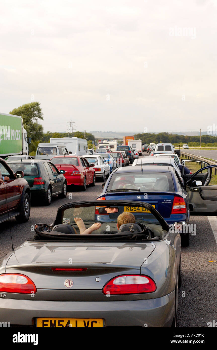 Major traffic jam on M5 motorway with drivers opening their cars doors ...