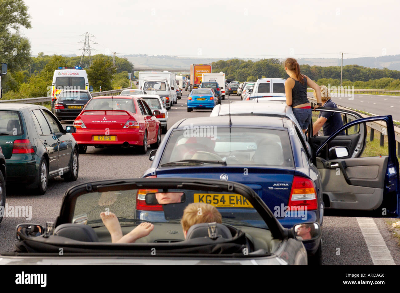 Major traffic jam on M5 motorway with drivers getting out of their cars ...