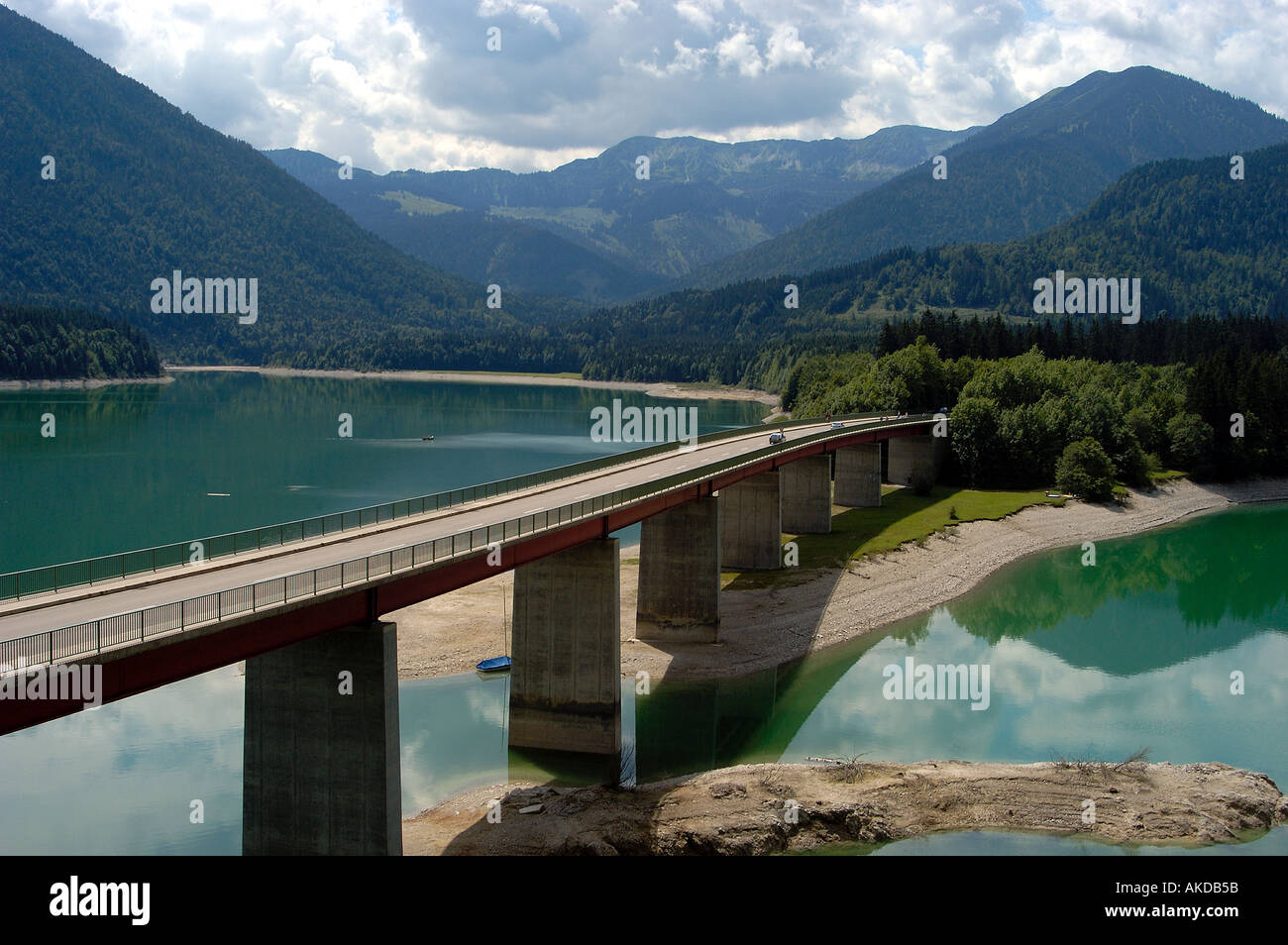 Road bridge over lake Sylvenstein with mountains in the background Alps ...