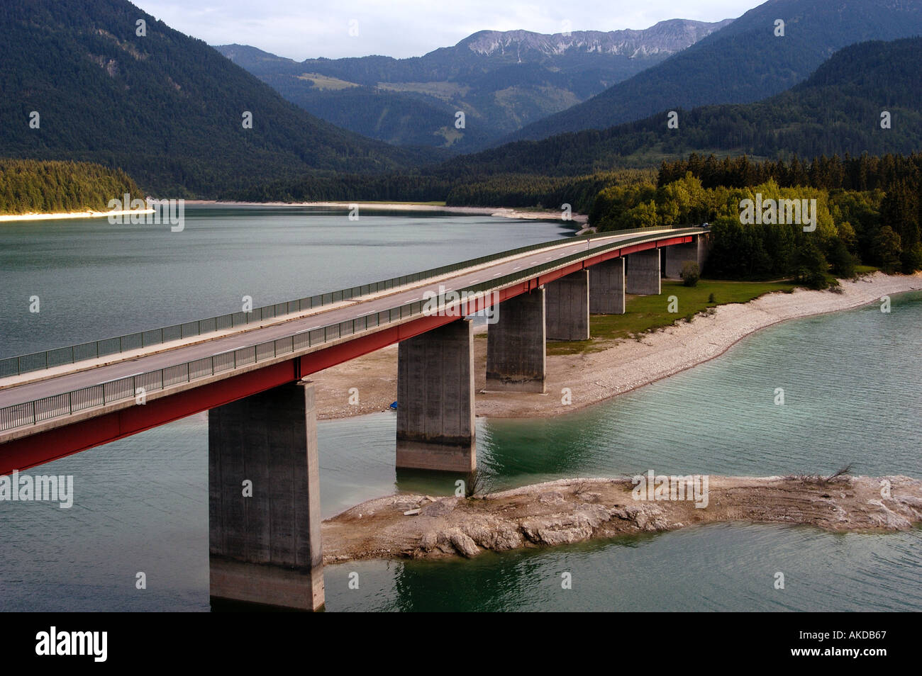 Road bridge over lake Sylvenstein with mountains in the background Alps ...