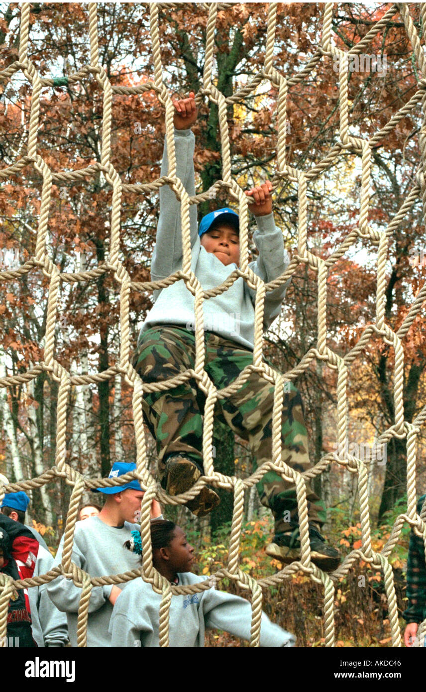 Black boy 14 climbing obstacle confidence course rope net at youth ...