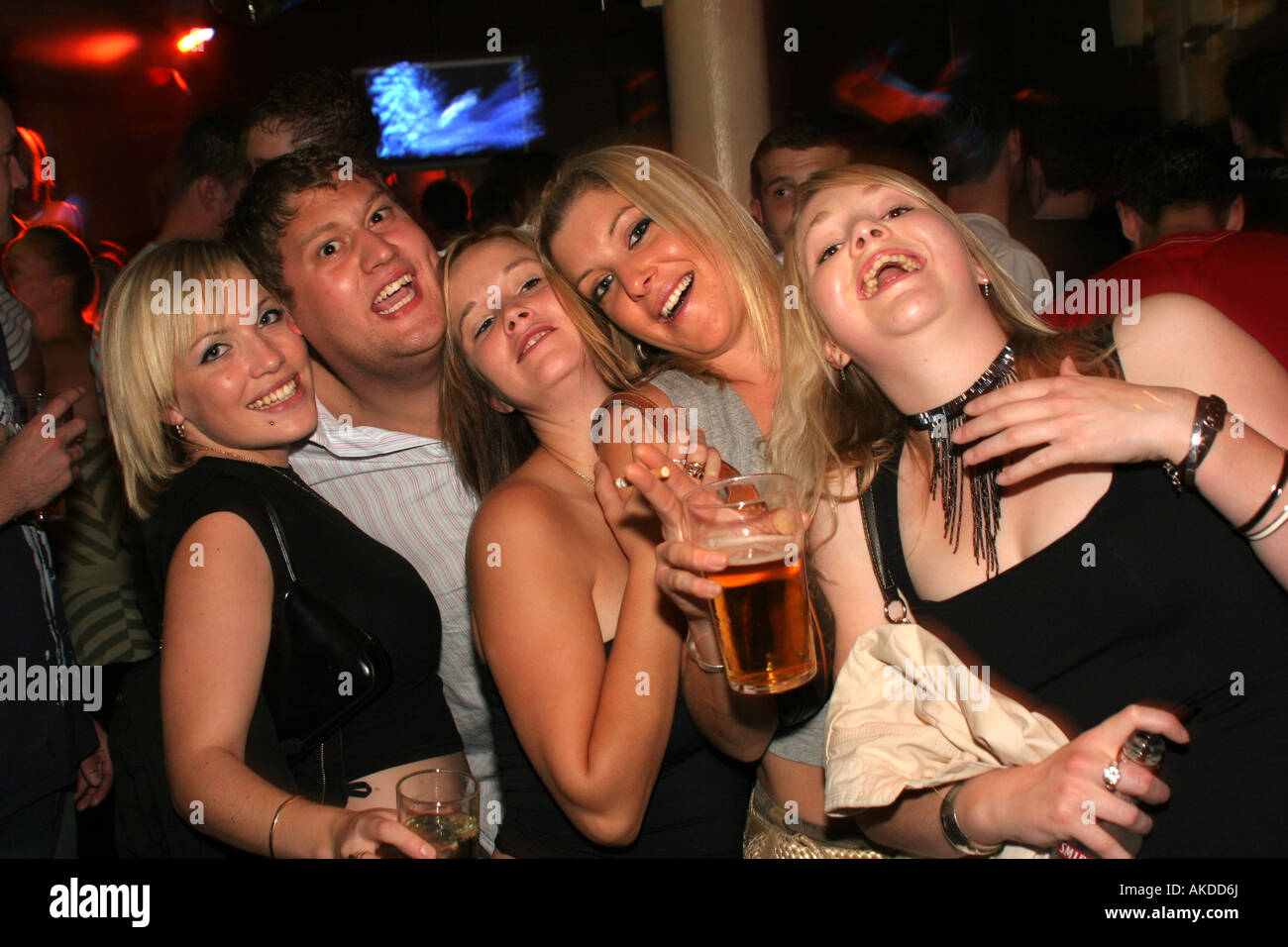 friends having fun out on the town at a pub Stock Photo - Alamy