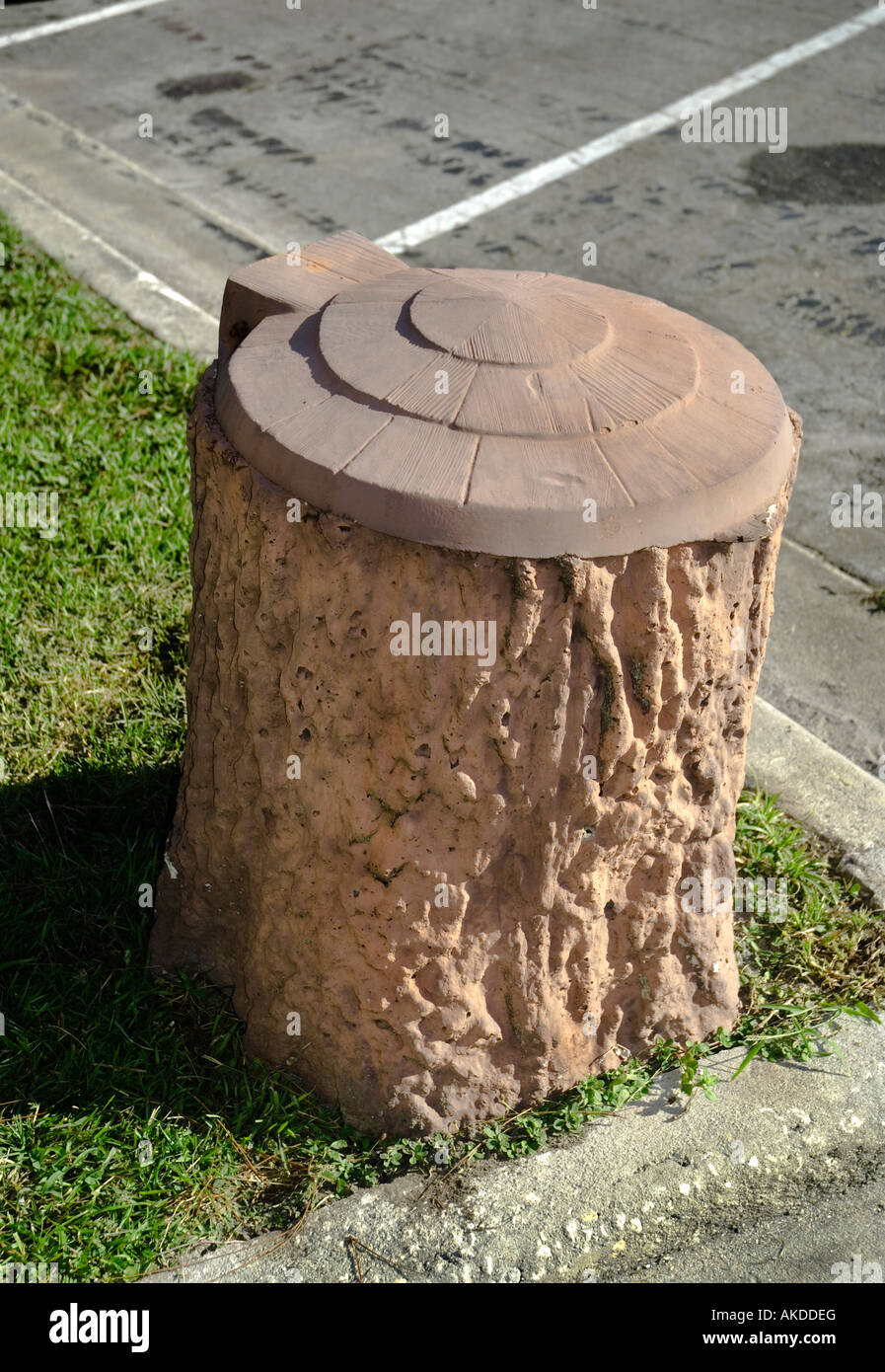 garbage can made to look like a tree trunk at Lake City Community ...