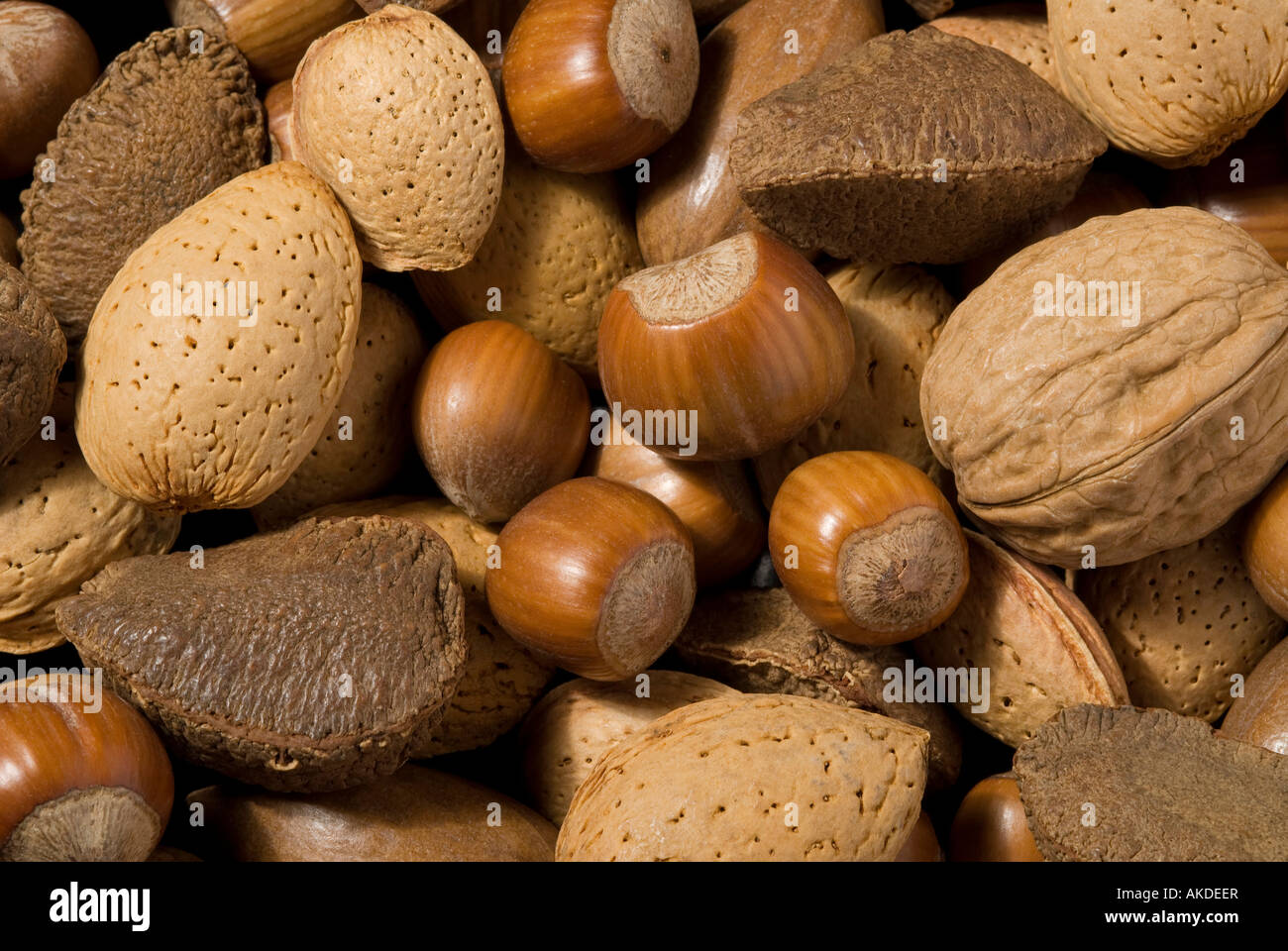mixed nuts includes almond, brazil, hazel and walnut Stock Photo - Alamy