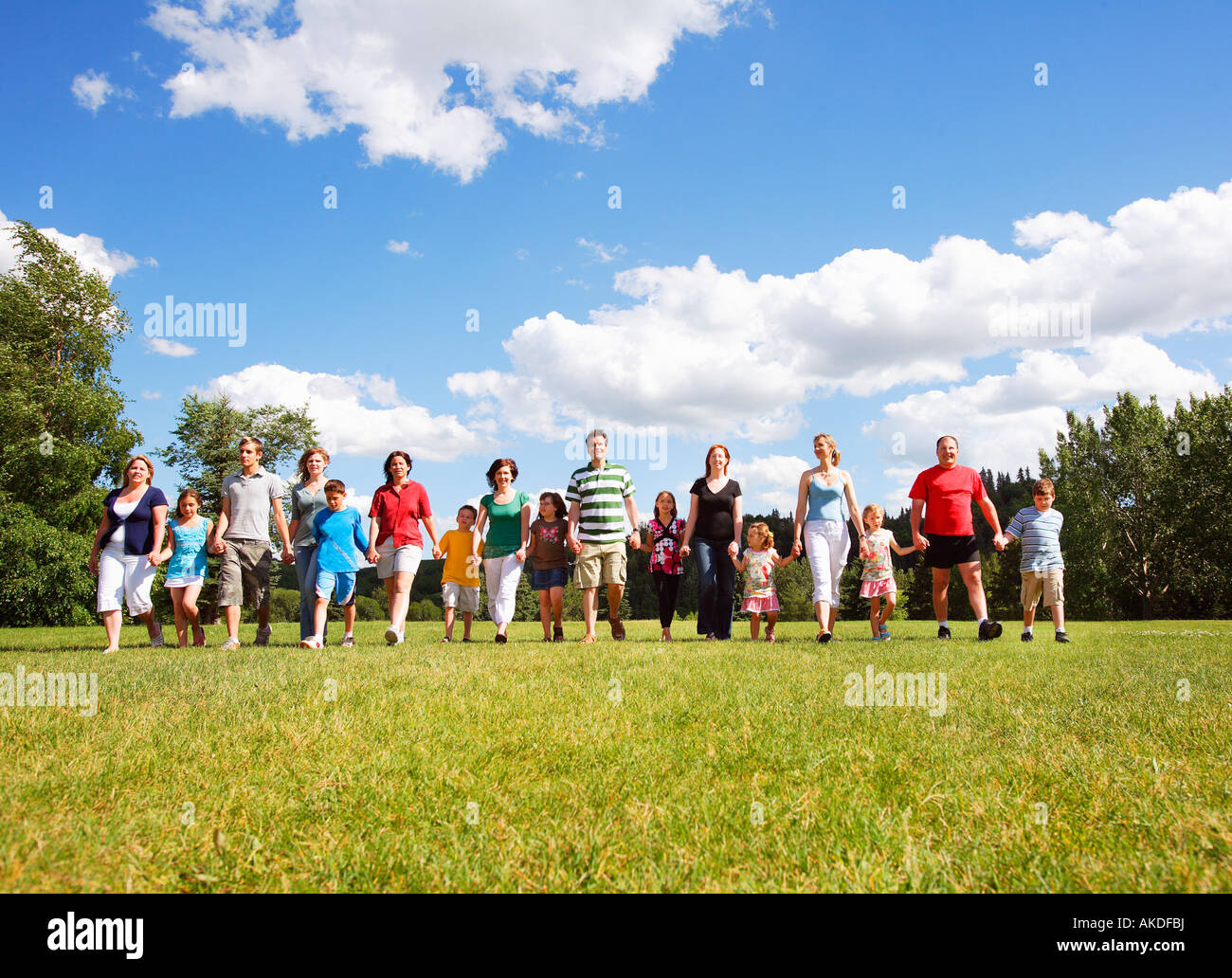 Group of people holding hands Stock Photo - Alamy
