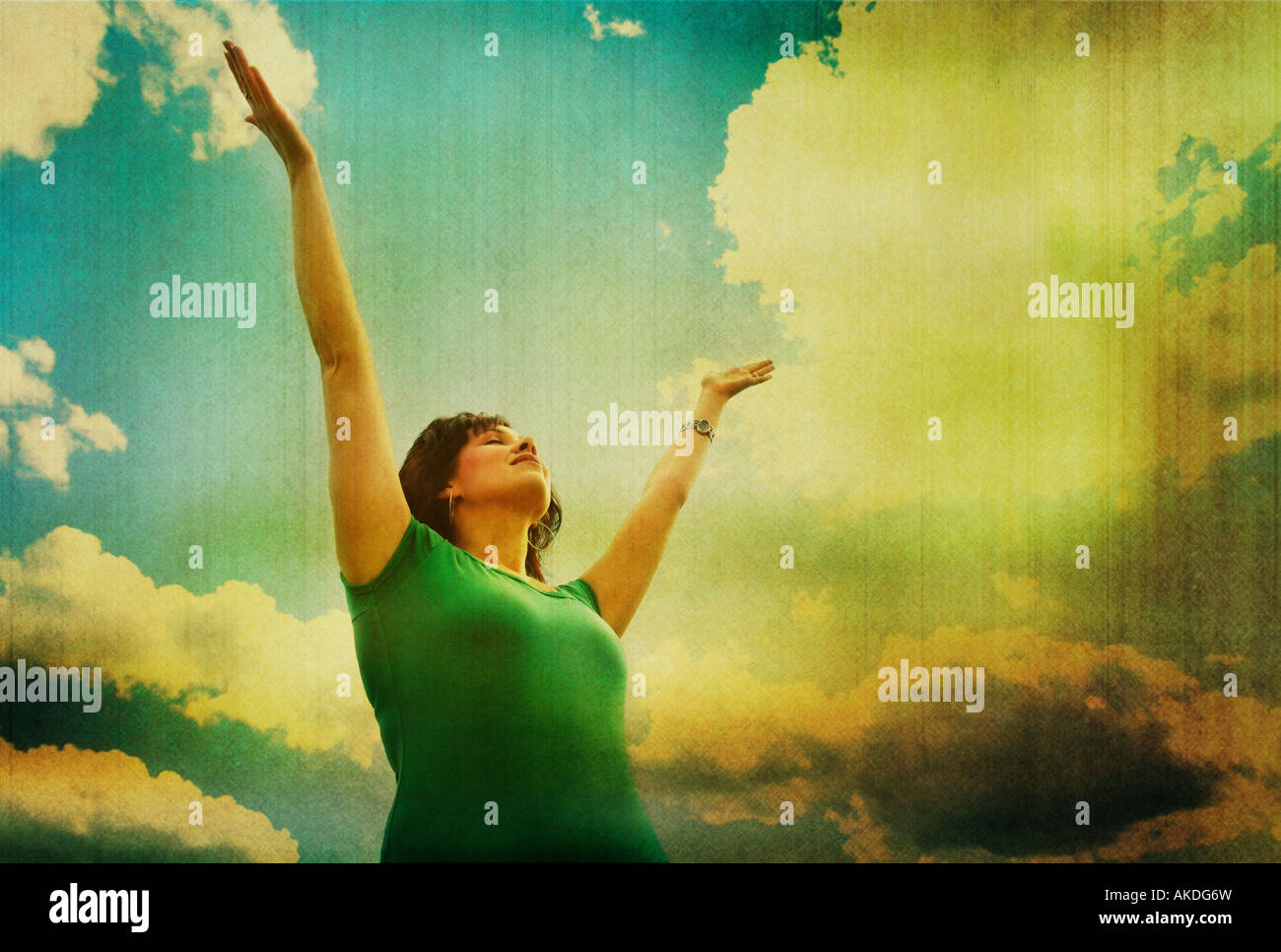Woman with arms raised Stock Photo - Alamy