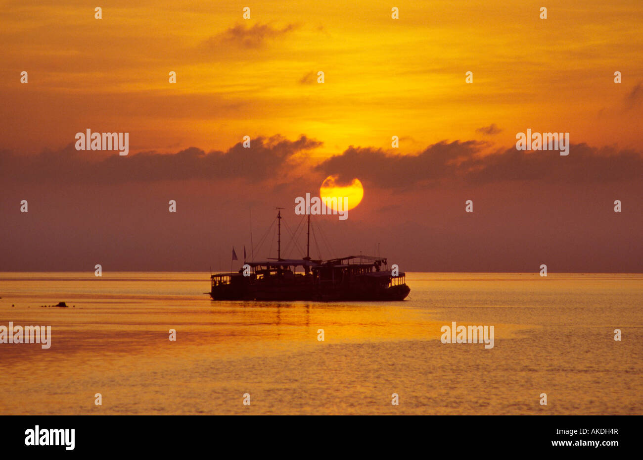 Boats at sunset. Ari Atoll, Maldives Stock Photo - Alamy